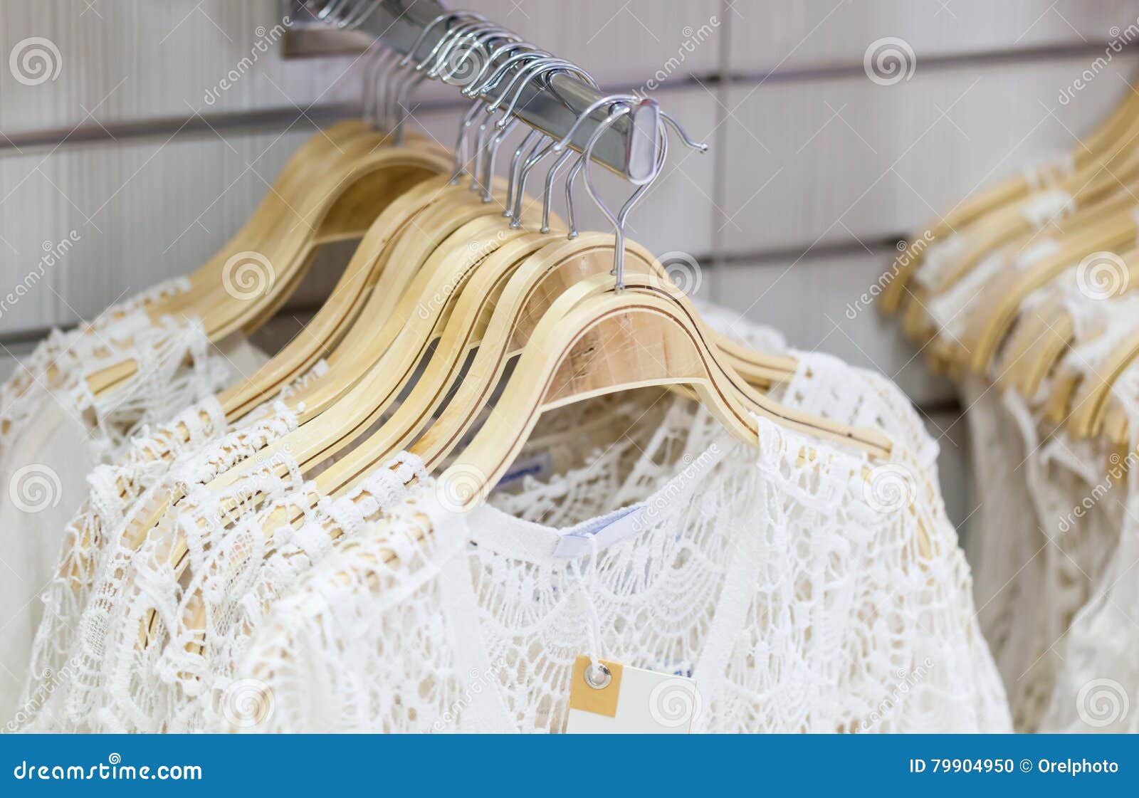 Clothes on Rail in Clothing Store Stock Photo - Image of display ...