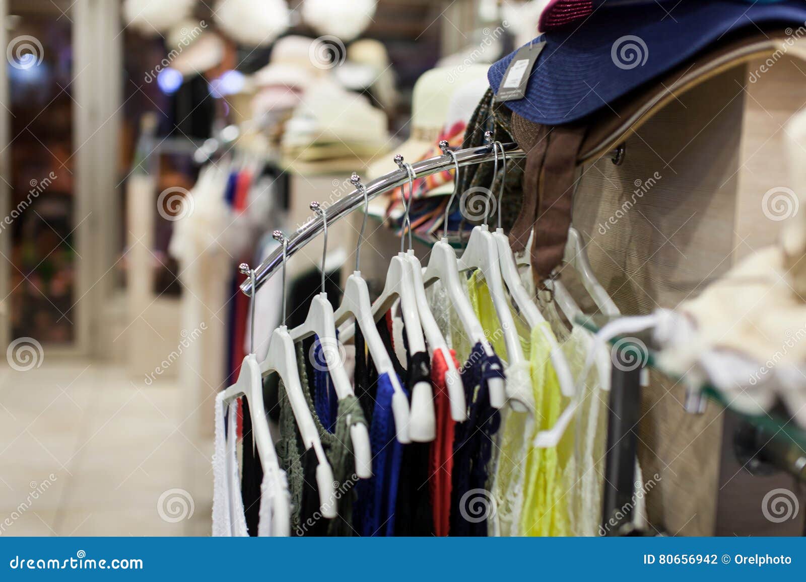 Clothes on Rail in Clothing Store Stock Photo - Image of clothes ...