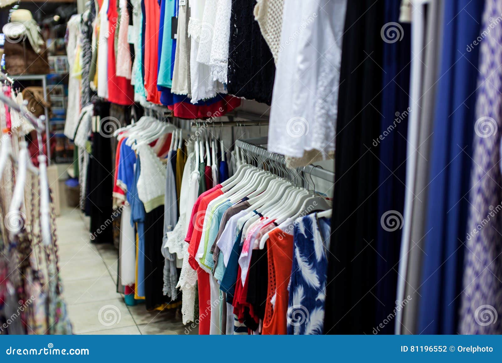 Clothes on Rail in Clothing Store Stock Photo - Image of market ...