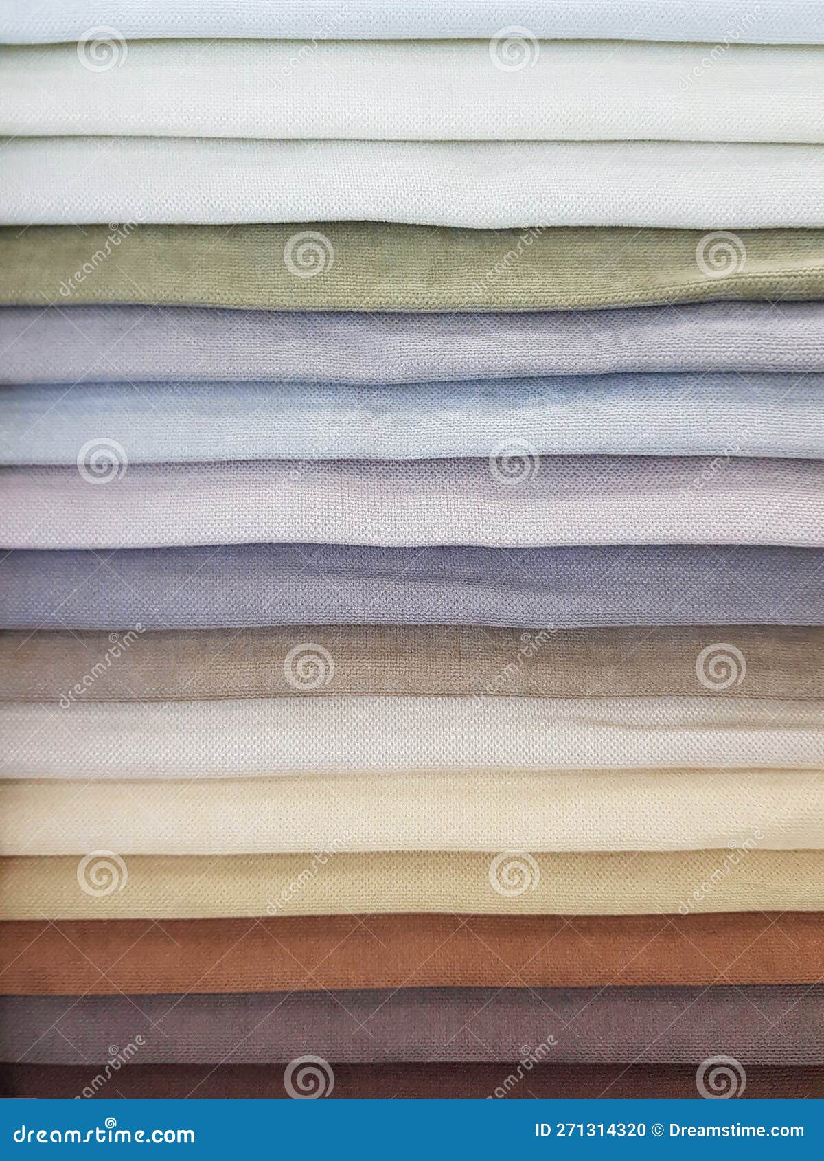 Clothes Stack. Bright Colourful Fabric of Beige Colours Stock Photo ...
