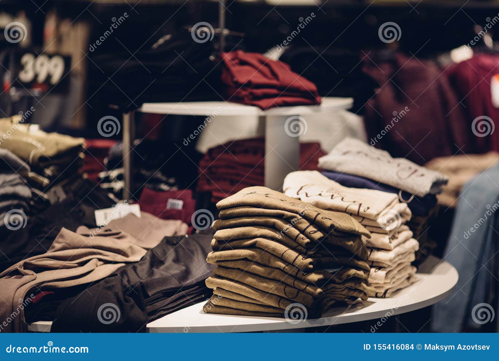 Stack of Men Clothes in Men`s Clothing Store Stock Photo - Image of ...