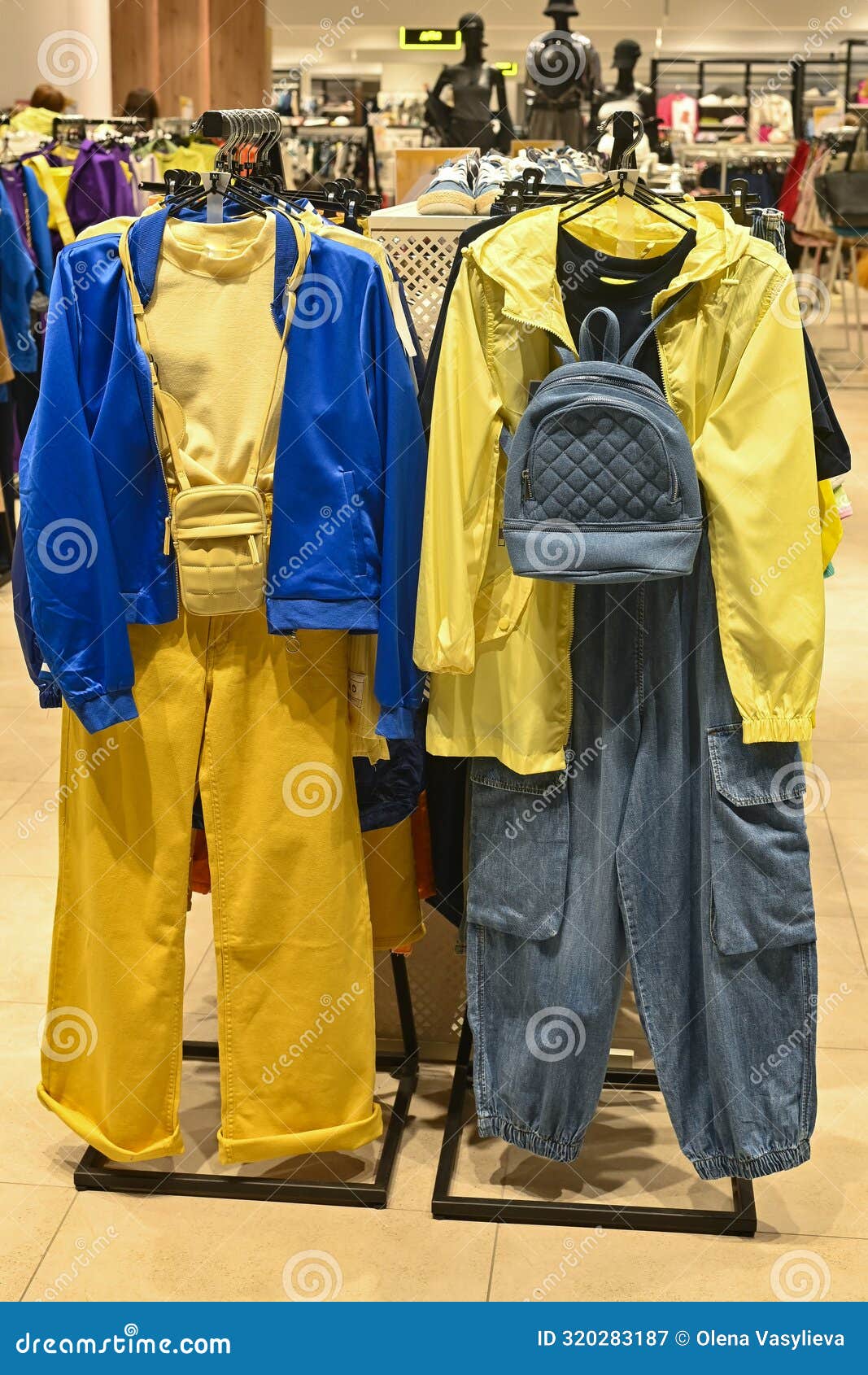 Clothes in the Store. Vertical Stock Image - Image of assorted, indoors ...