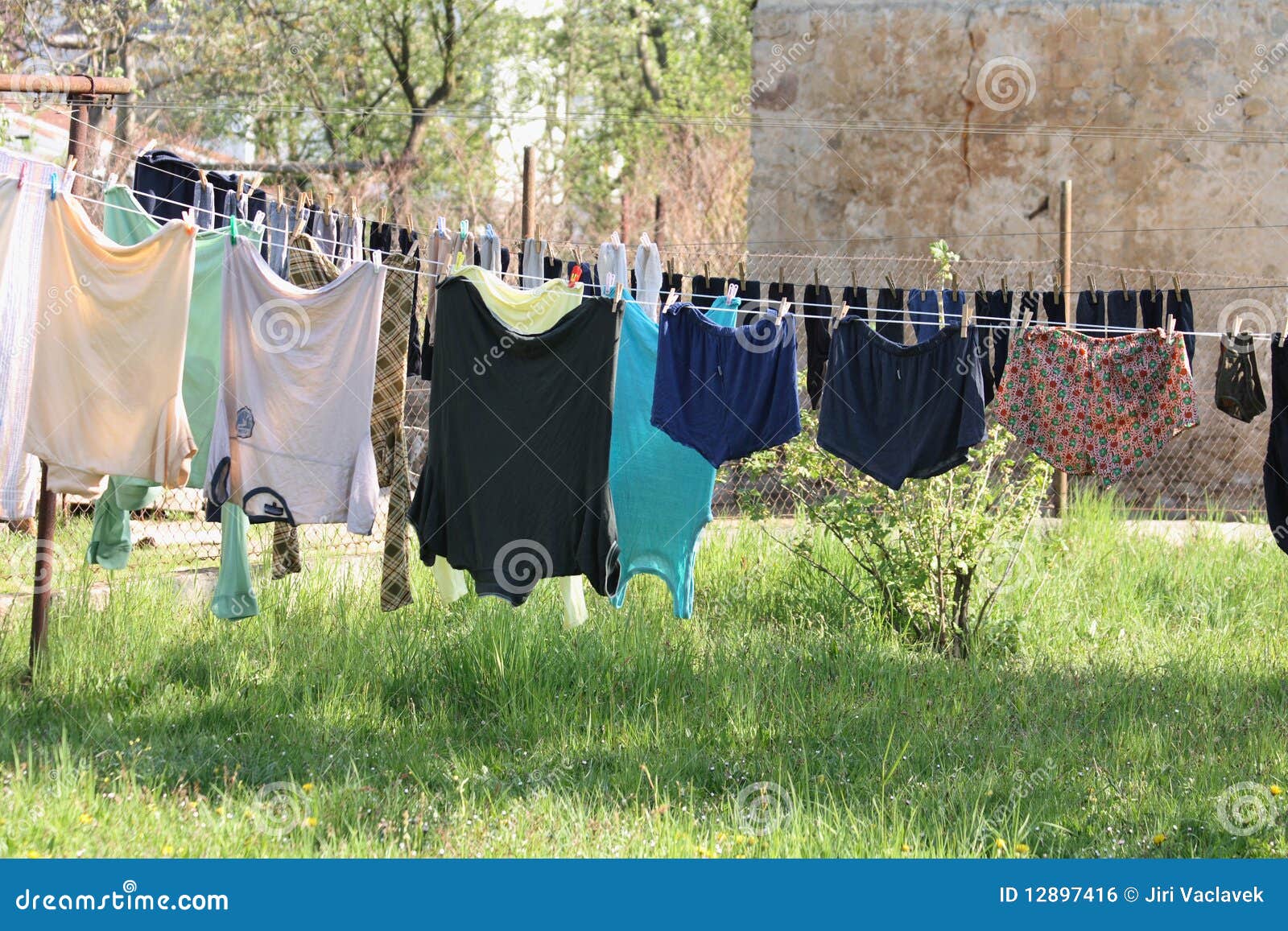 Clothes in the sun stock photo. Image of striped, clothing - 12897416