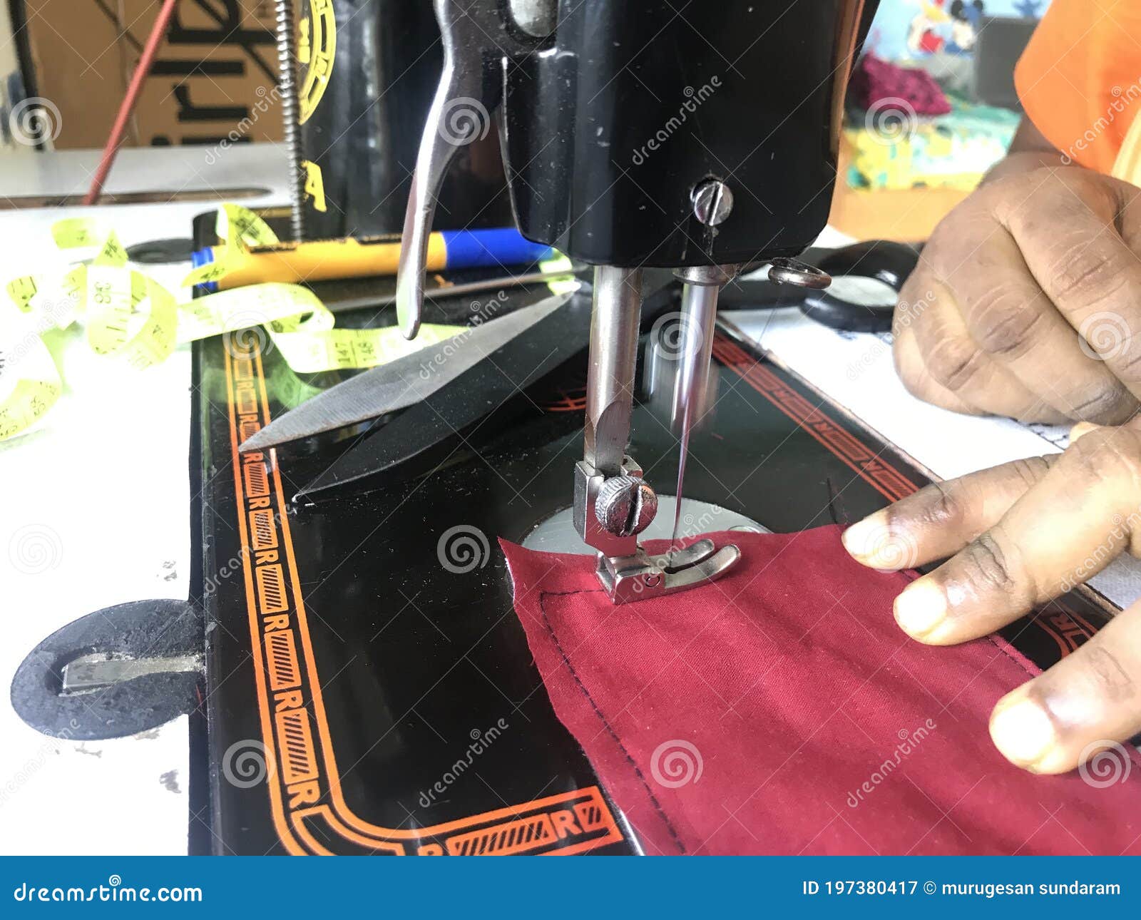 Cotton Clothes are Under Stitching Process by an Indian Working Lady ...