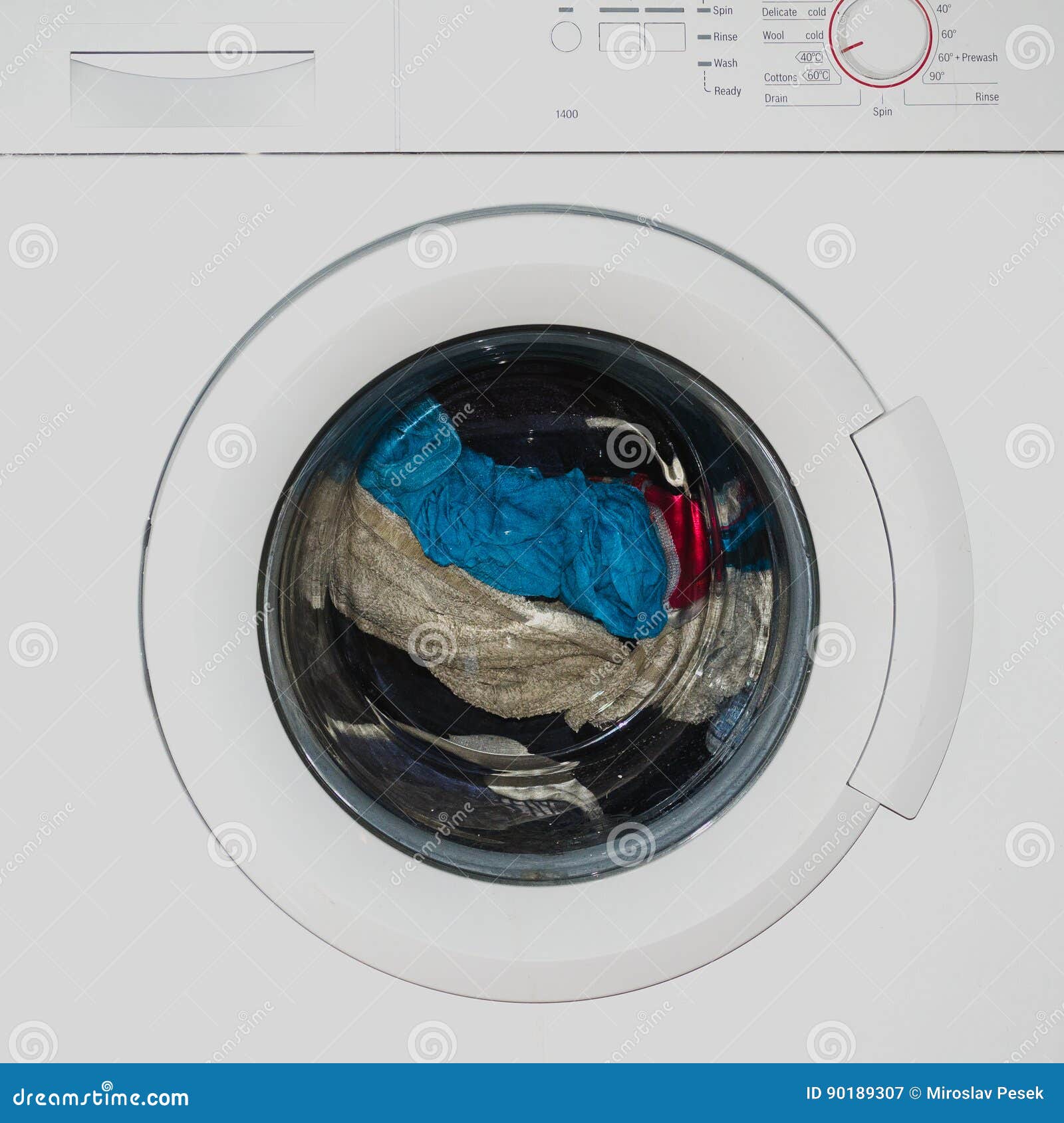 Clothes in washing machine stock image. Image of load - 90189307