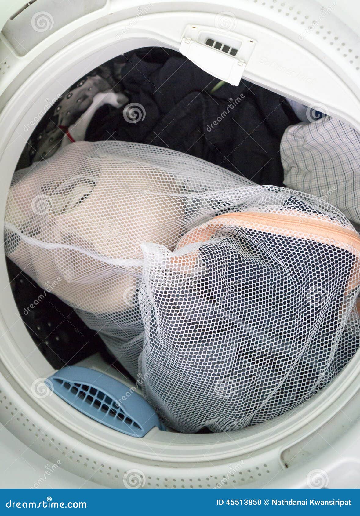 Clothes in the Washing Net in the Washing Machine Tube Stock Photo ...