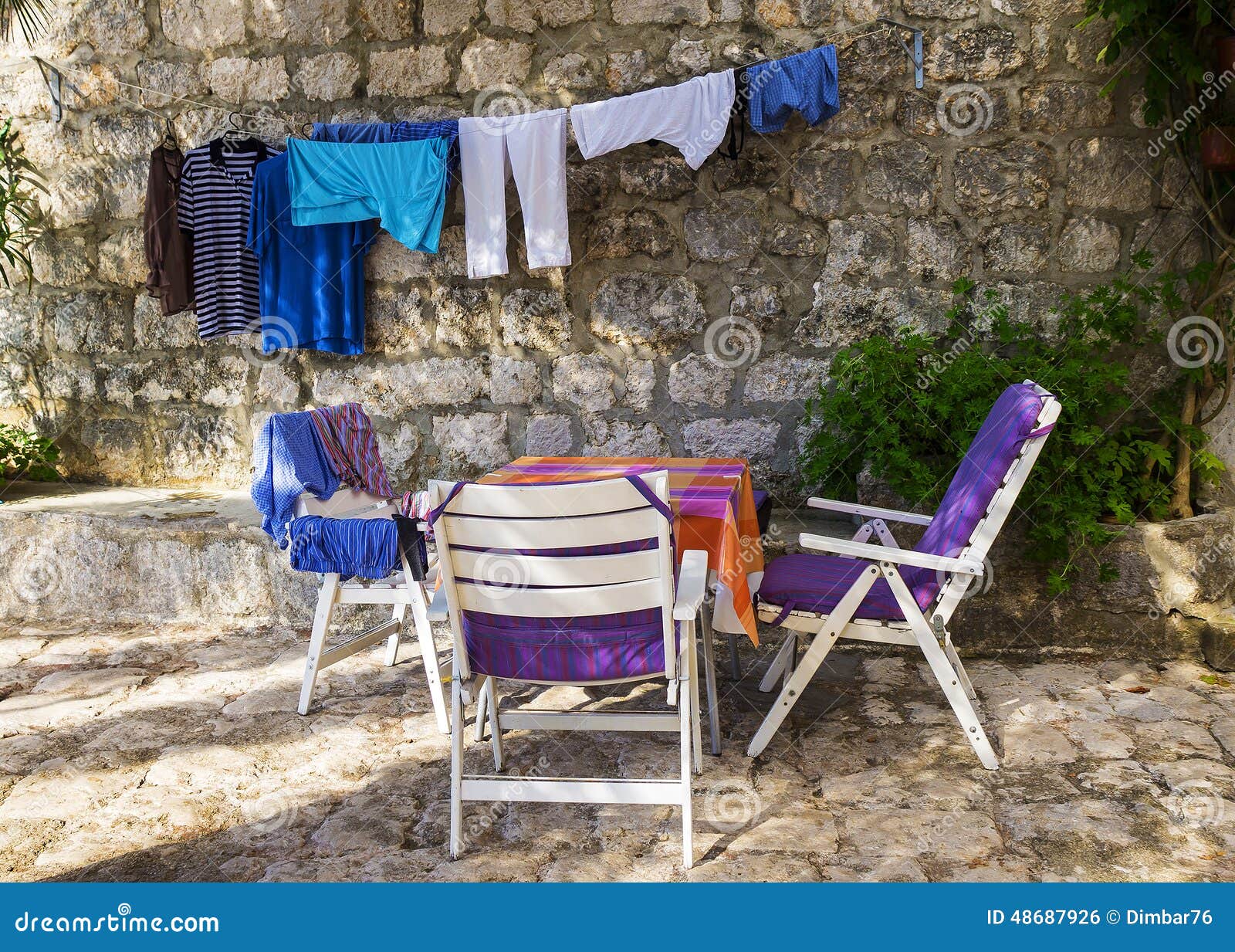 Clothes after Washing and the Table Stock Photo - Image of green ...