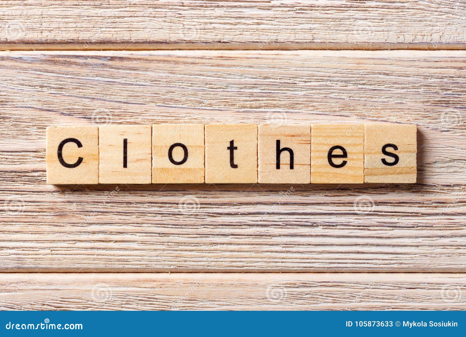 Clothes Word Written on Wood Block. Clothes Text on Table, Concept ...