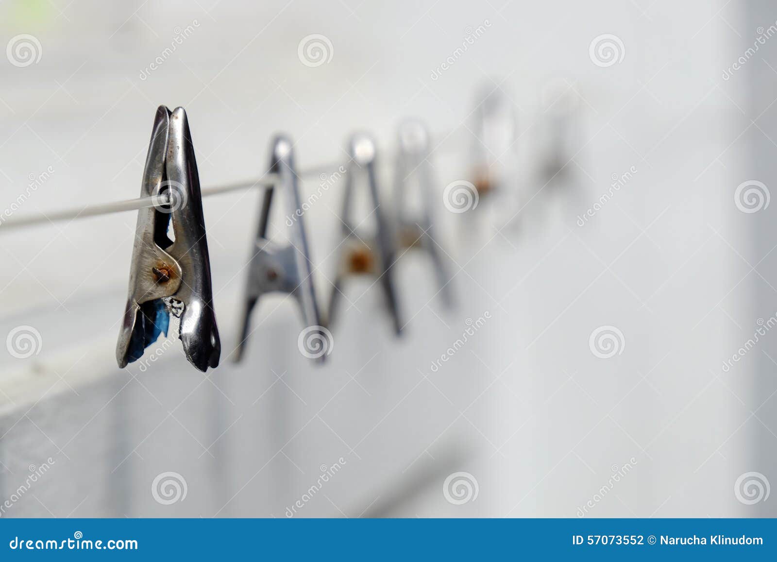 Clothespin on clothesline stock photo. Image of dress - 57073552
