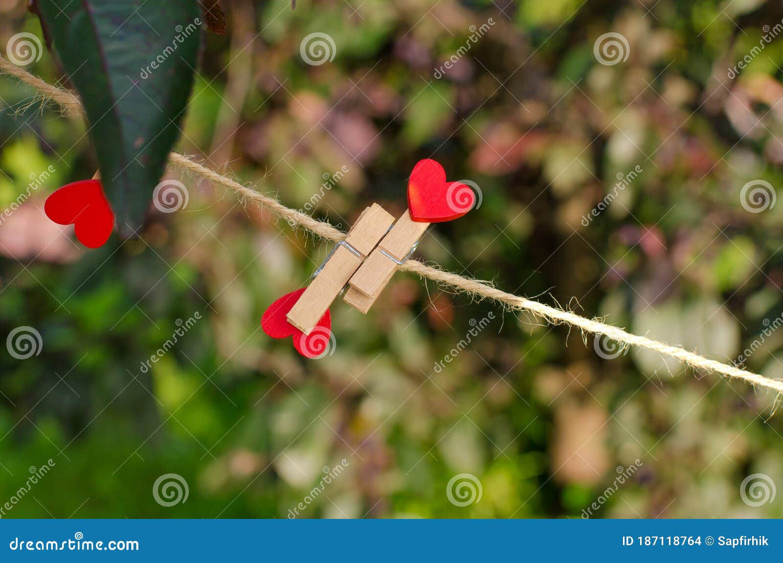 Clothespin with a heart stock photo. Image of flirting - 187118764