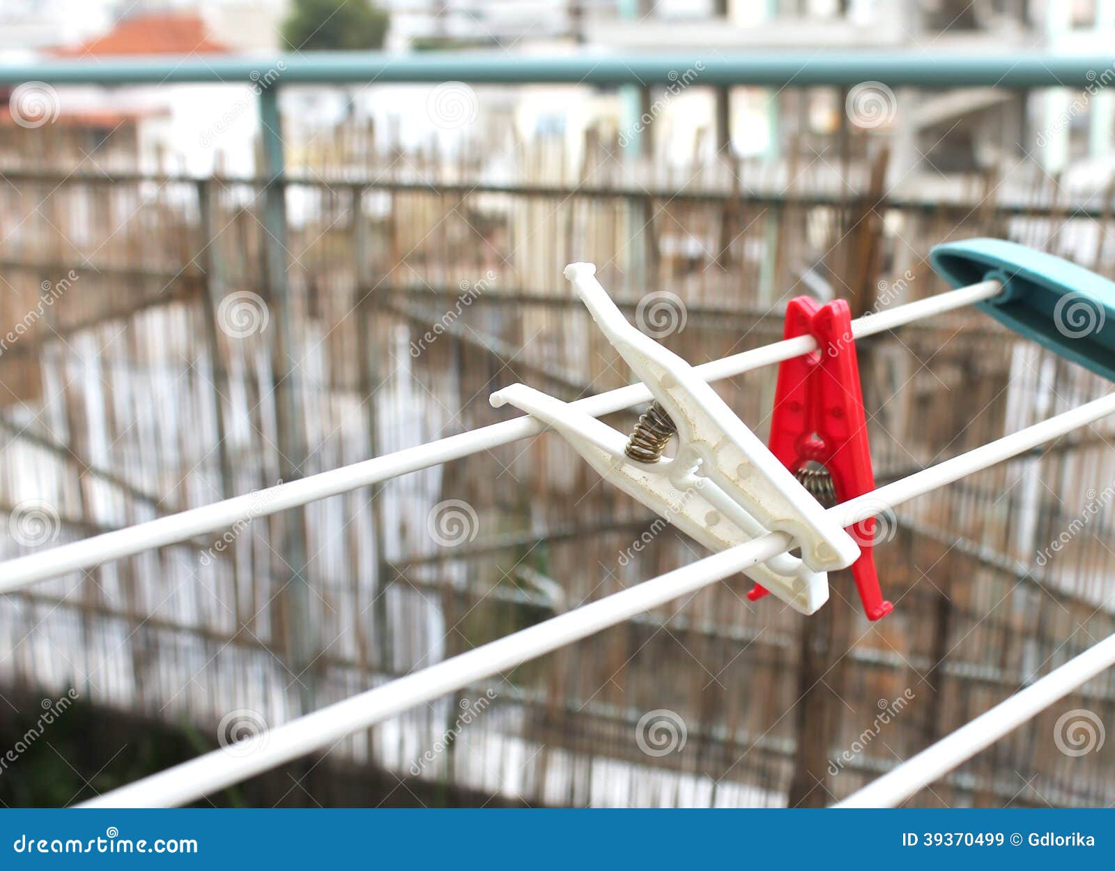 Clothespins on the balcony stock image. Image of house - 39370499