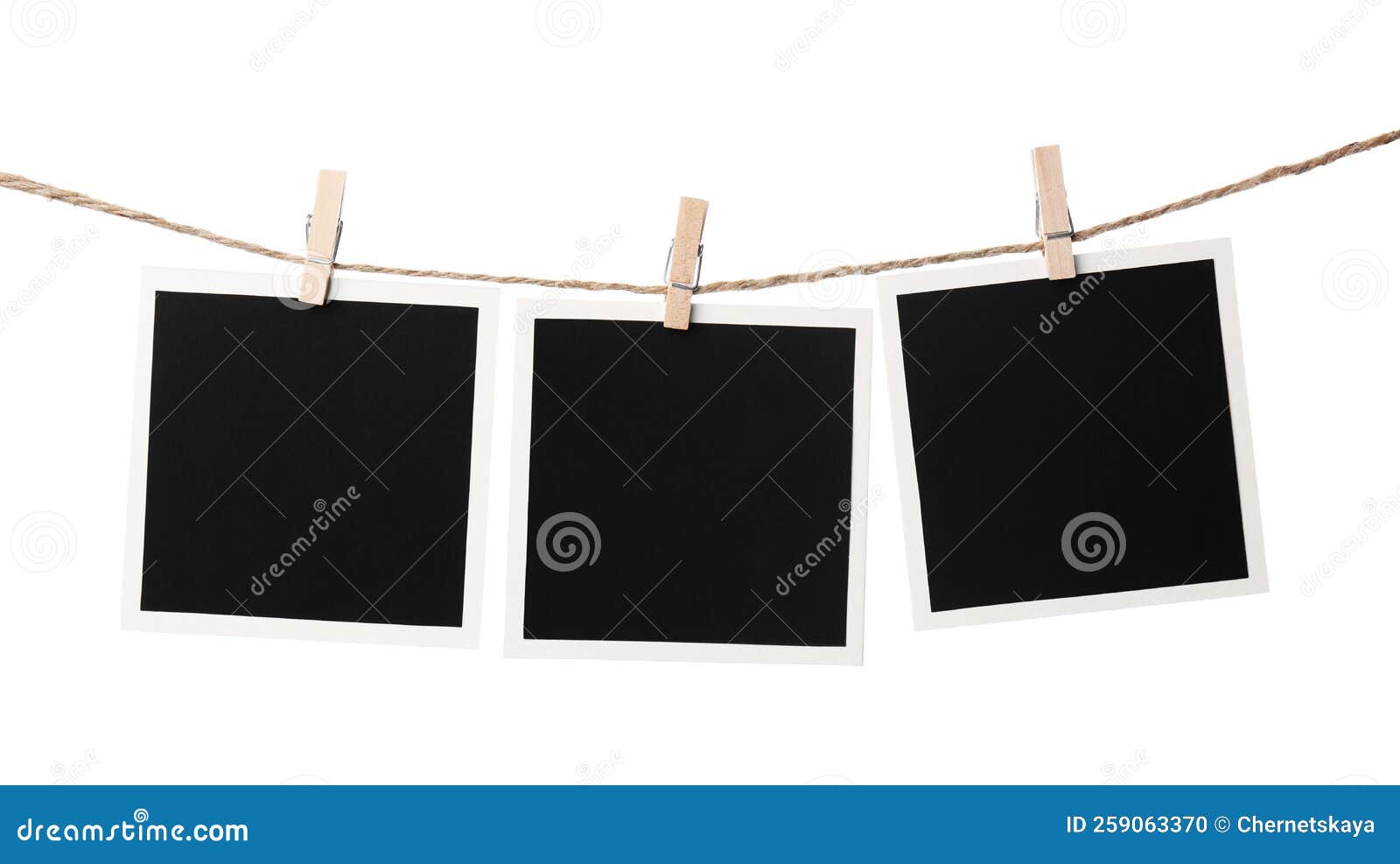 Clothespins with Empty Instant Frames on String Against White ...