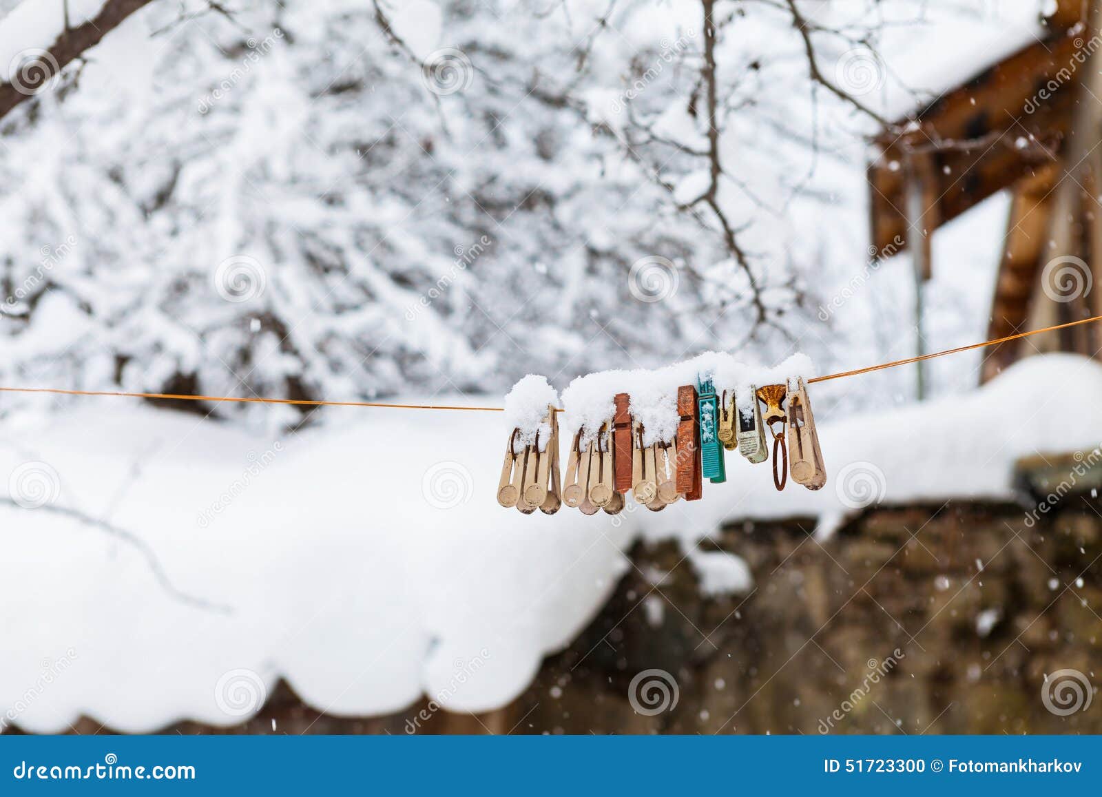 Clothespins on a Rope Under Snow Stock Photo - Image of line, cloud ...