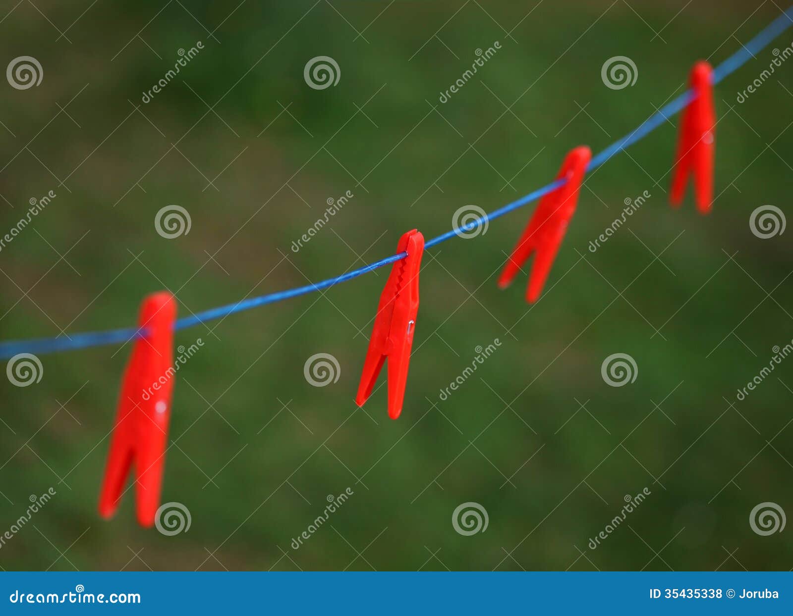 Clothespins on string stock photo. Image of grass, clothespin - 35435338