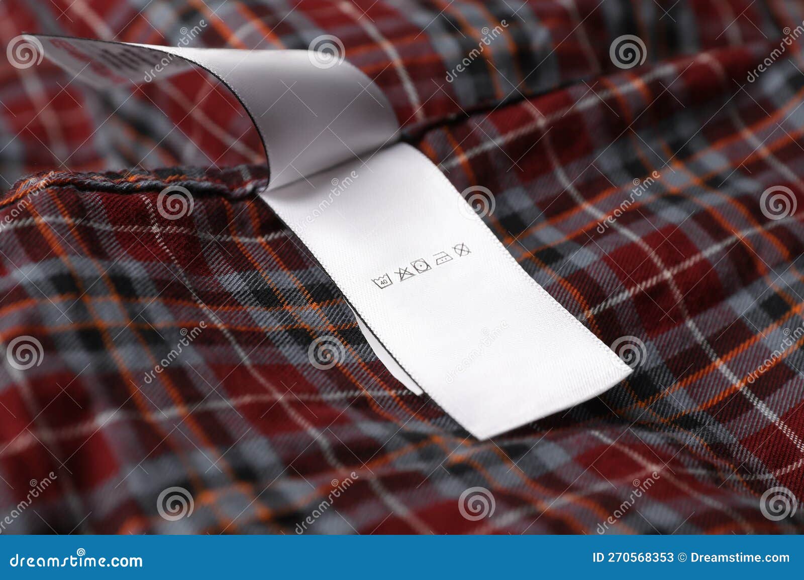 Clothing Label on Beautiful Checkered Garment, Closeup Stock Image ...