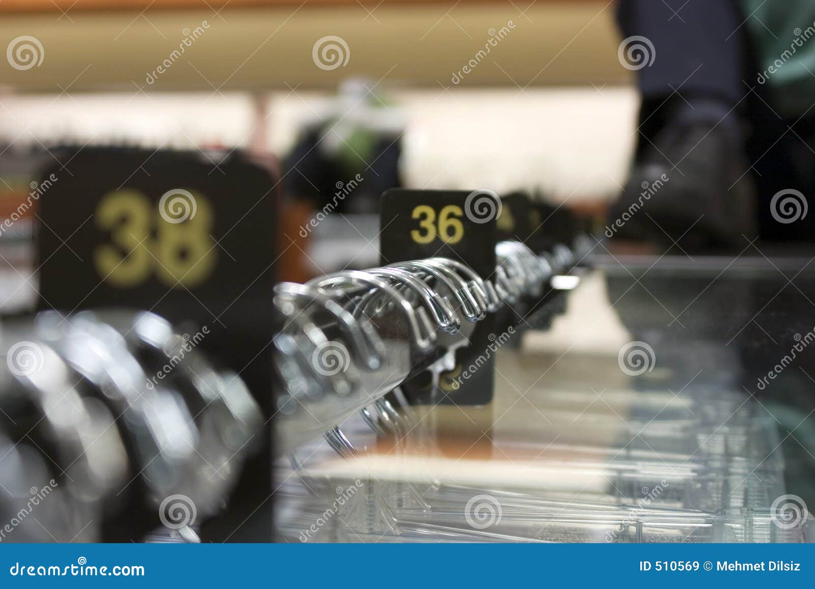 Clothing Racks with Sizes 36 and 38 Showing Stock Image - Image of ...