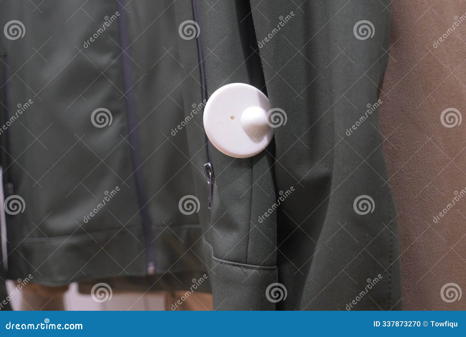 Clothing Security Tag on a Shirt , Stock Photo - Image of round ...