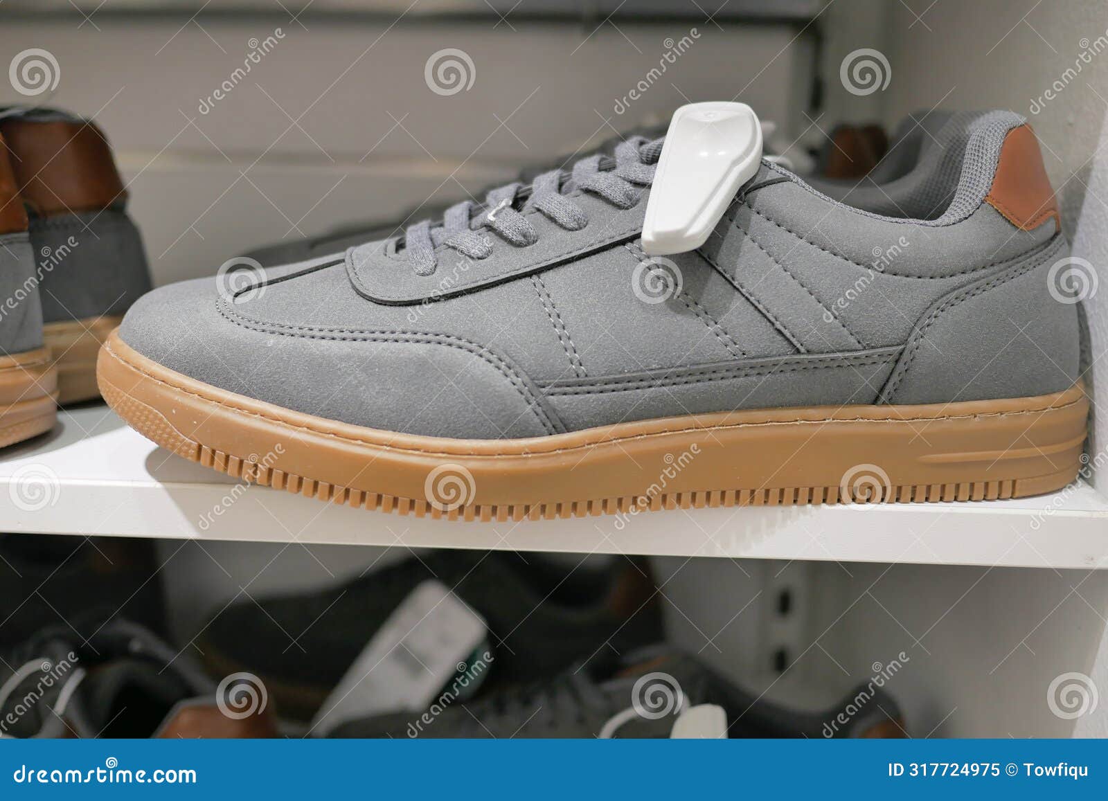 Clothing Security Tag on a a Shoe , Stock Image - Image of scanner ...