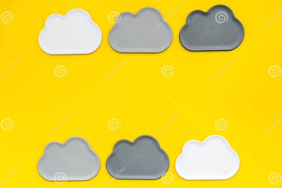 Cloud Computing Concept with Clouds on Yellow Background Top View Space ...