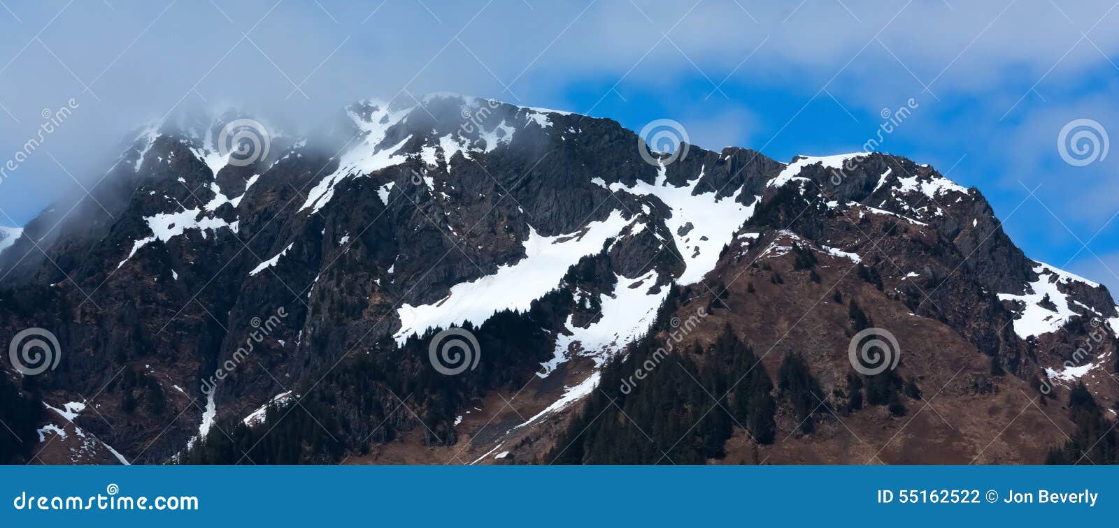 Cloud covered Mountain Top stock photo. Image of ridge - 55162522