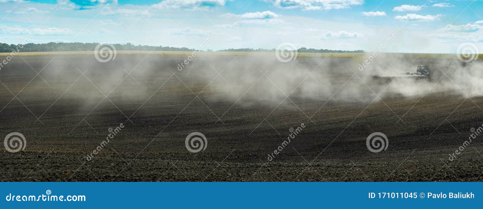 A Cloud of Dust on a Plowed Field Farms are in Preparation for Sowing ...
