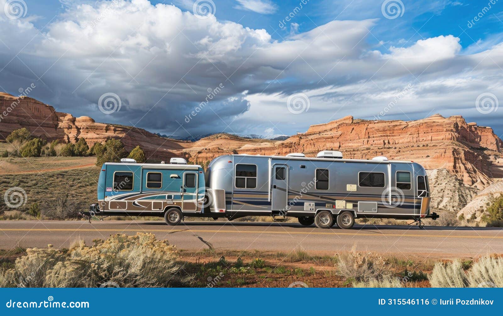 A Cloud of Dust Rises As One RV Tows Another Down a Dirt Road Stock ...