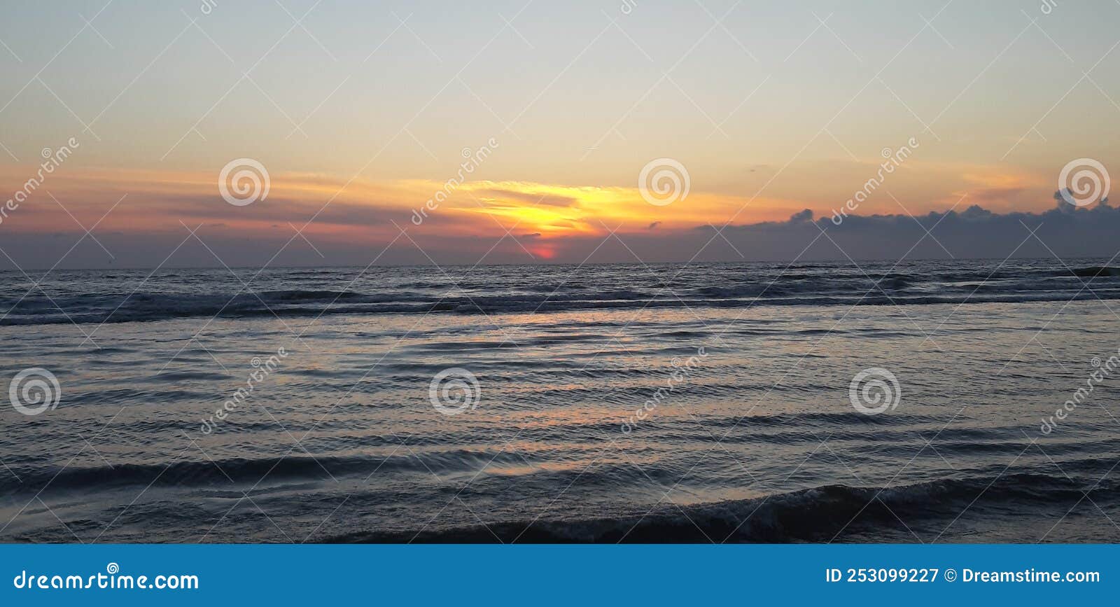 Cloud Edge Sunset with Waves Stock Image - Image of morning, shore ...