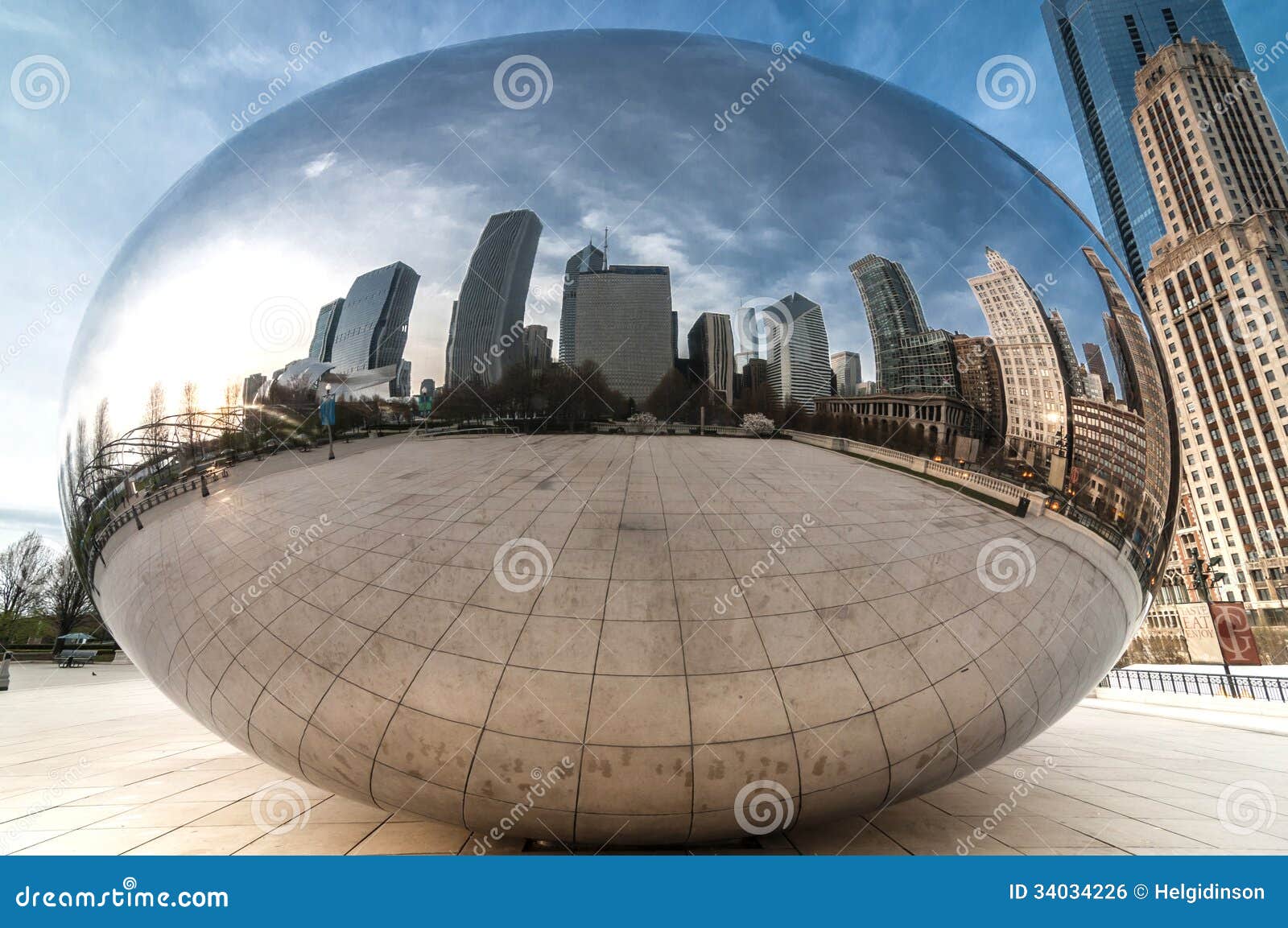 Cloud Gate Sculpture, AKA The Bean, Against Downtown Skyline In Chicago ...