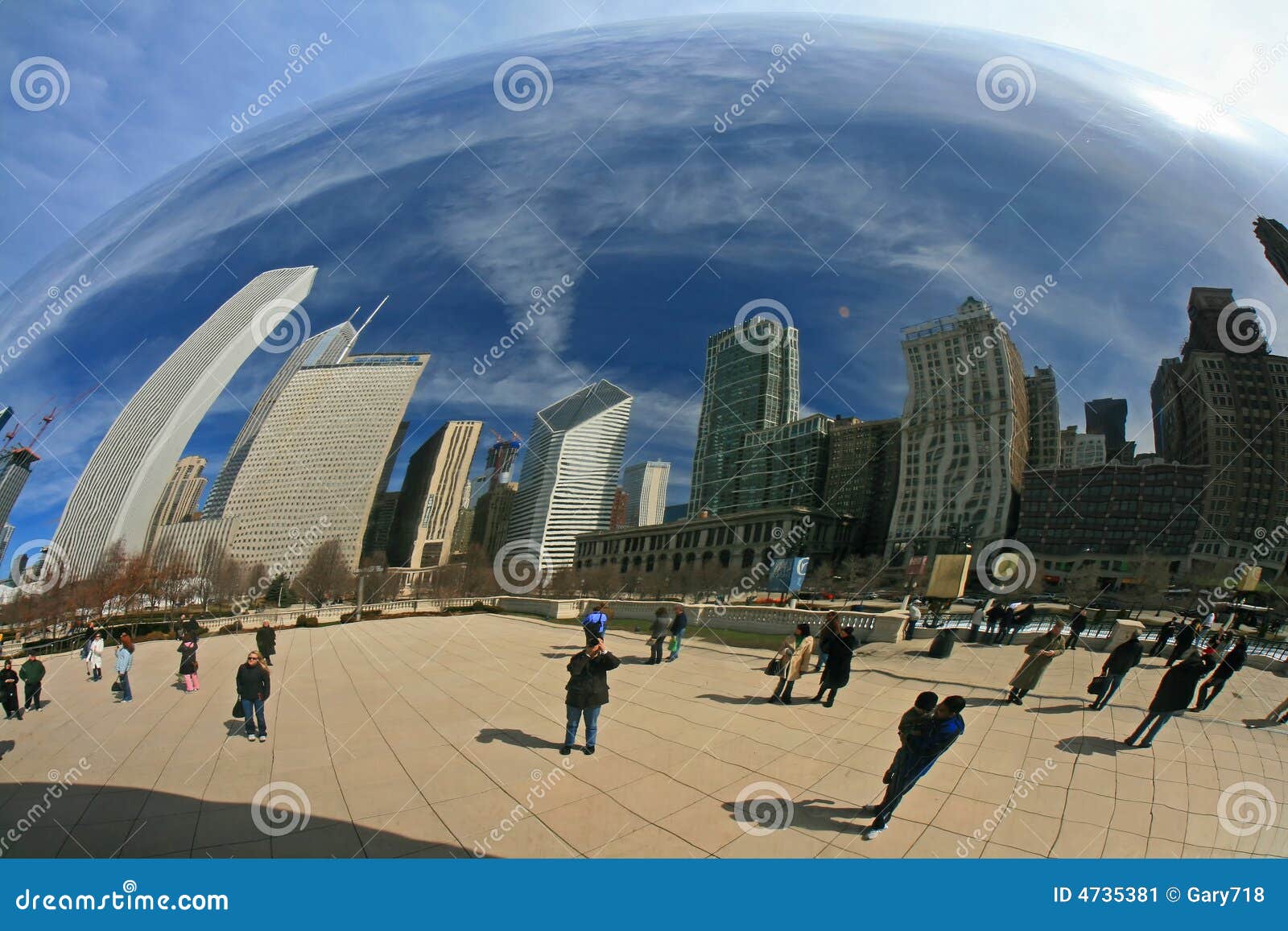 Cloud Gate Sculpture, AKA The Bean, Against Downtown Skyline In Chicago ...