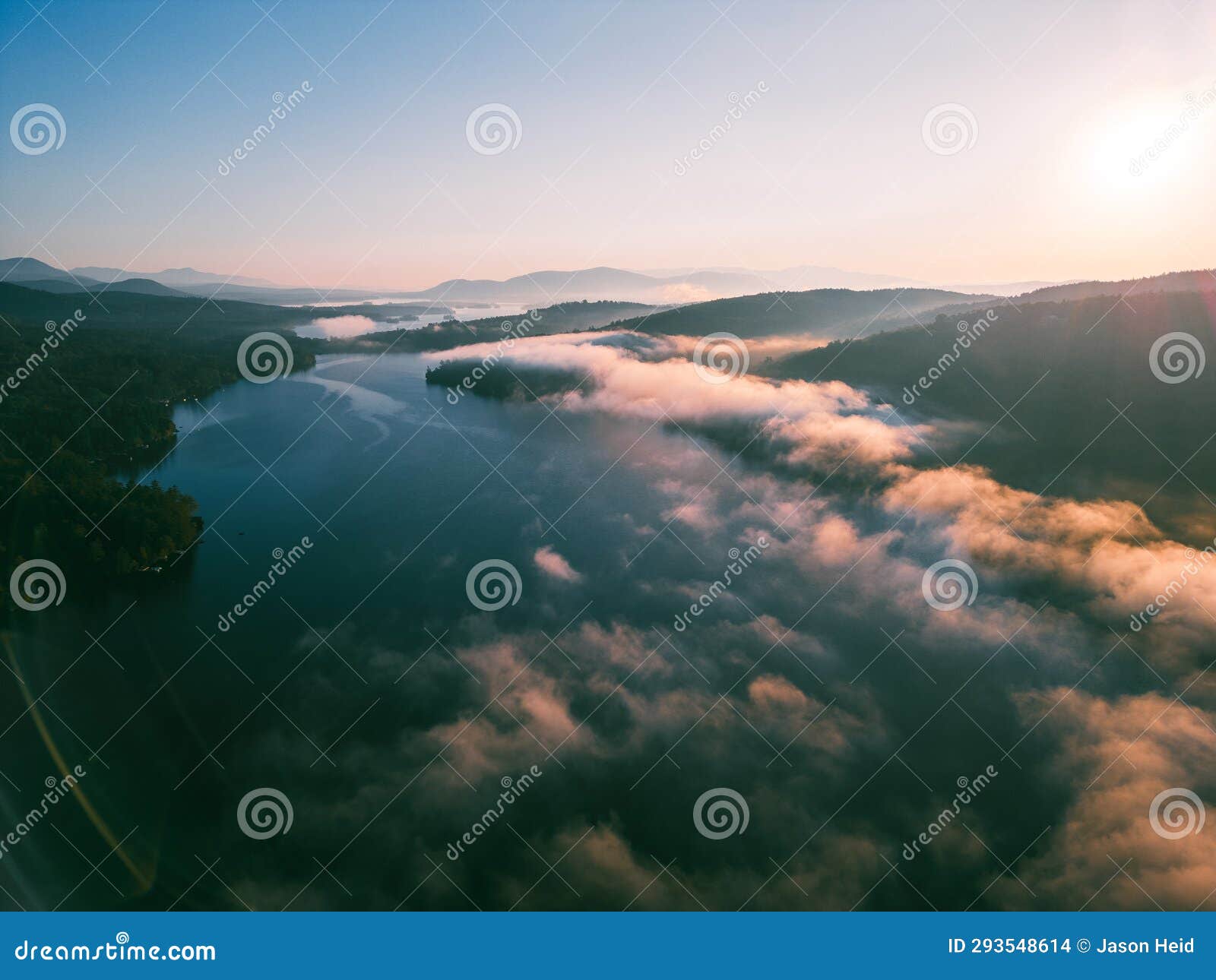 Cloud Inversion Over Little Squam Lake at Sunrise in Fall Stock Photo ...