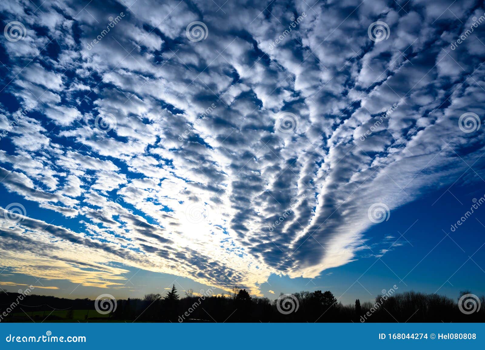 Cloud Band in Blue Sky. Rippled Altocumulus Clouds Spreading Out. Cloud ...