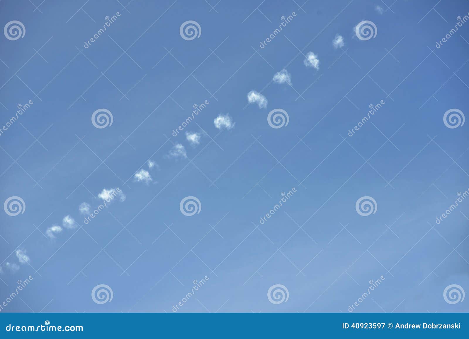 Cloud Puff Trails stock image. Image of clouds, blue - 40923597
