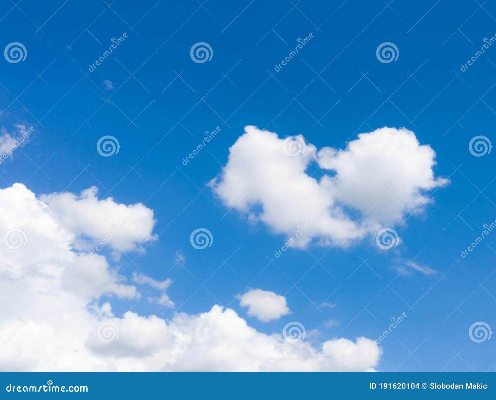 A Cloud in the Shape of a Broken Heart. Scenic View of White Clouds in ...