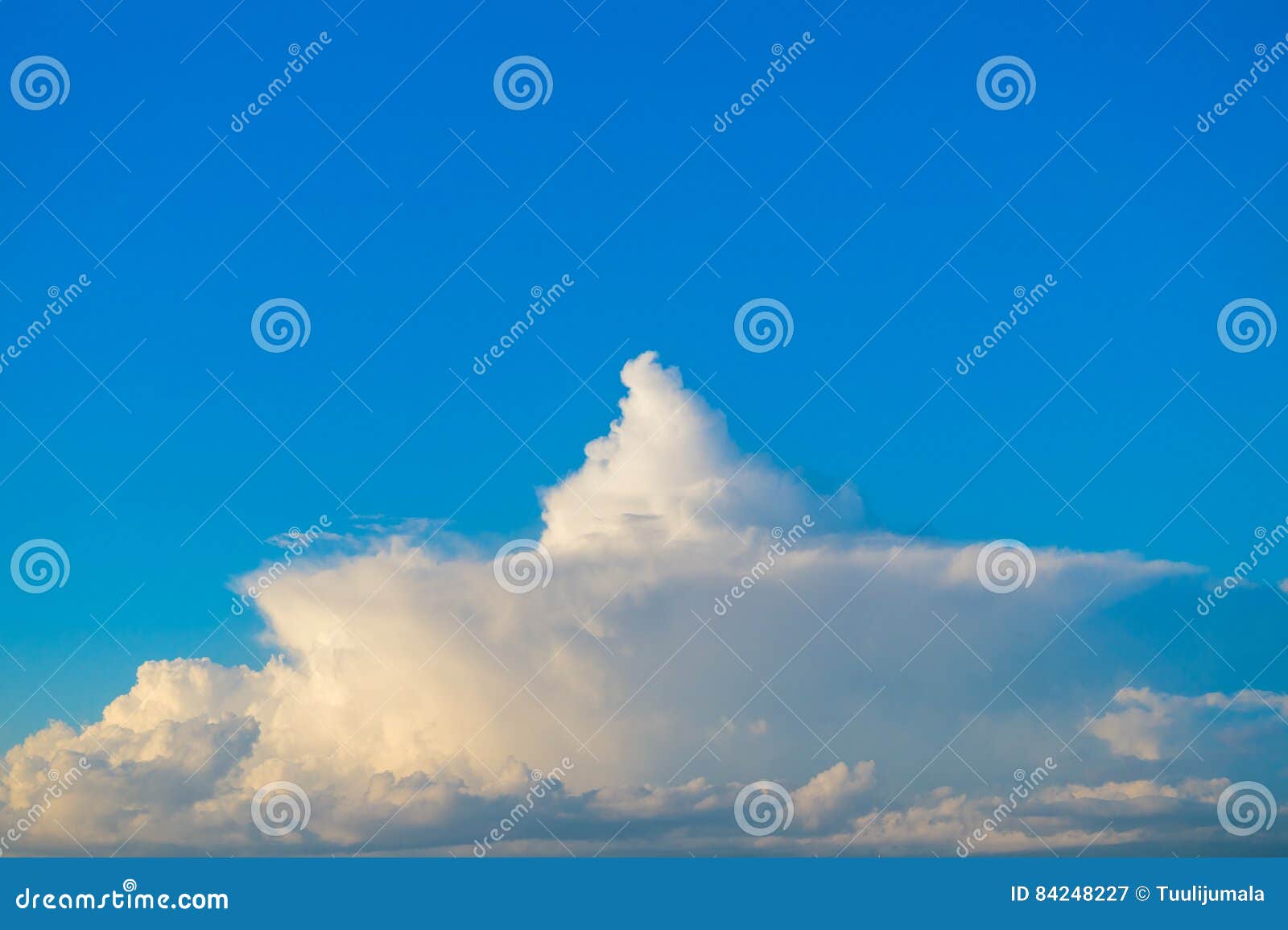 Cloud in the Shape of Cake or Boat Against Blue Sky. Stock Image ...