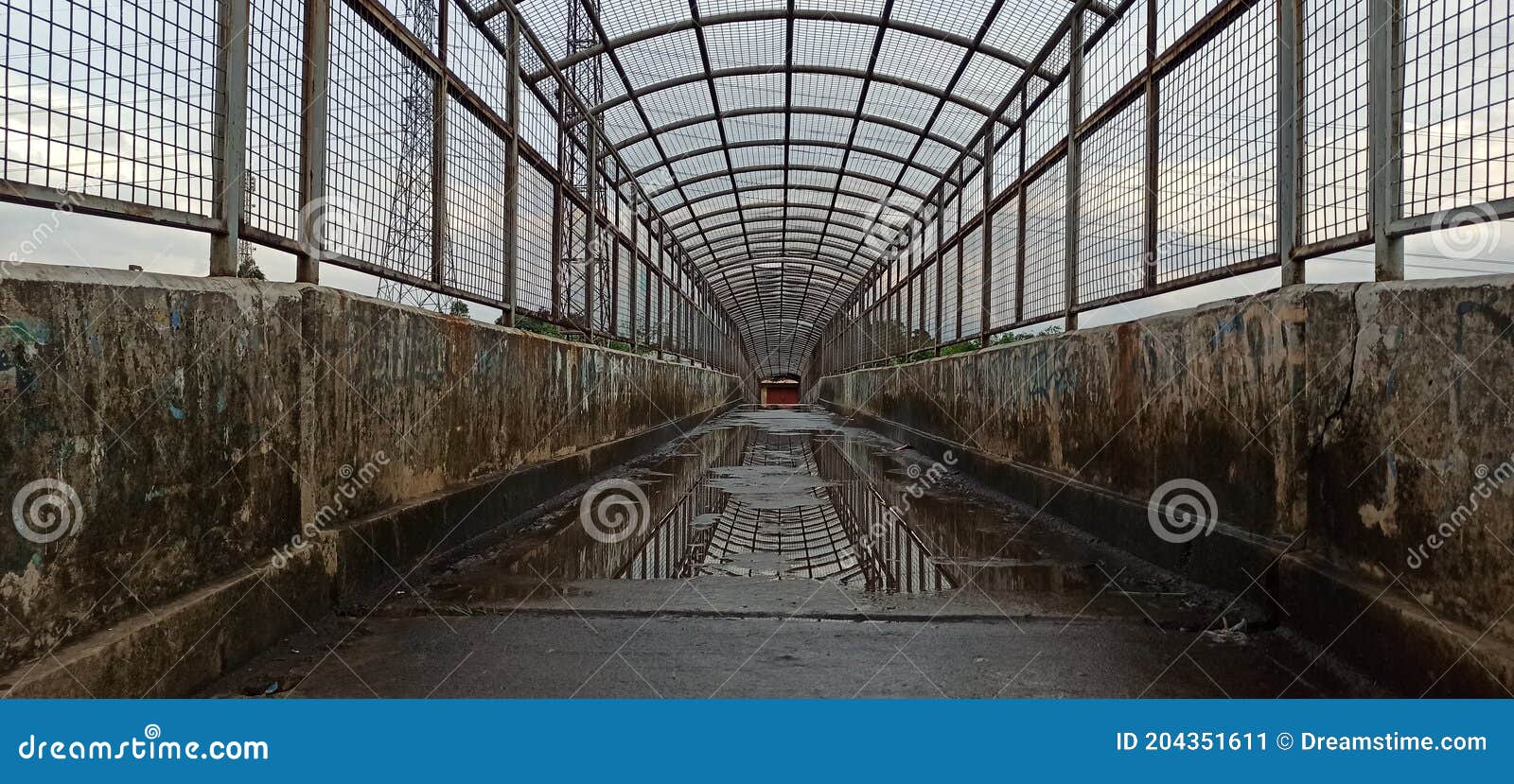 Under Metal Mesh On Steel Walkways Or Caged In Walk Way Over Passing ...