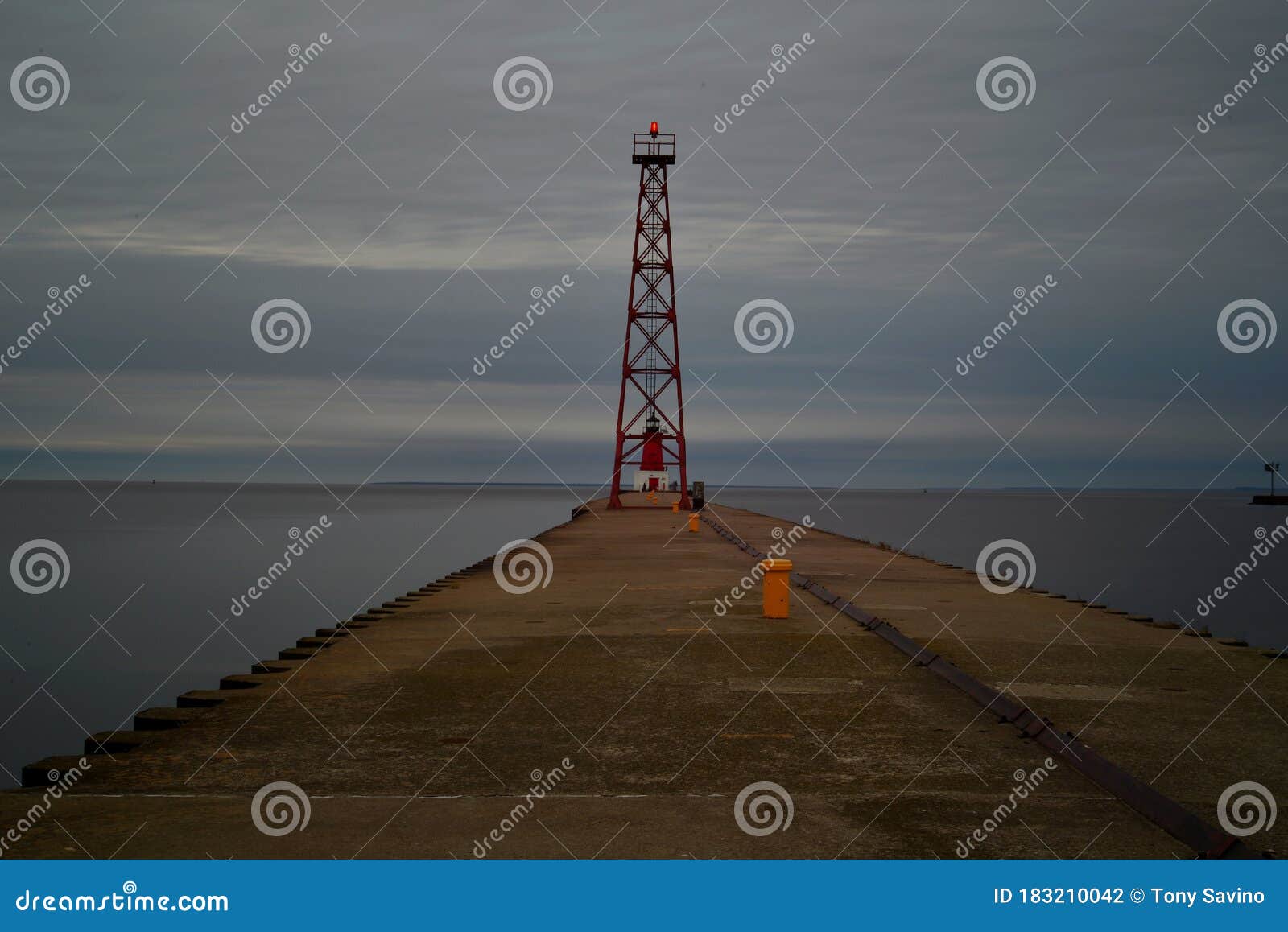 Clouded Skies at Dust on Marinette, Wisconsin Pier Stock Photo - Image ...