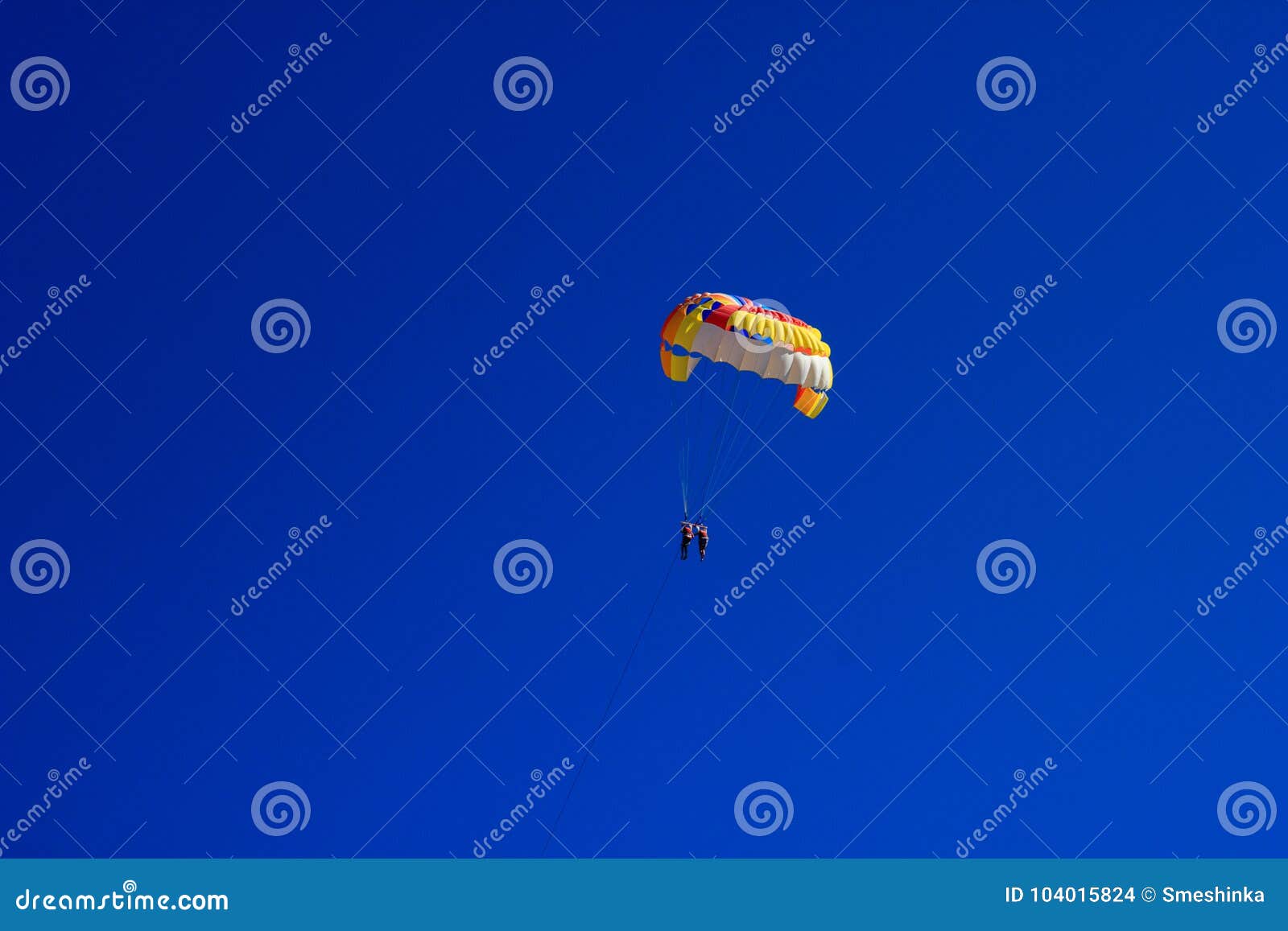 Cloudless day parasailing stock photo. Image of extreme - 104015824