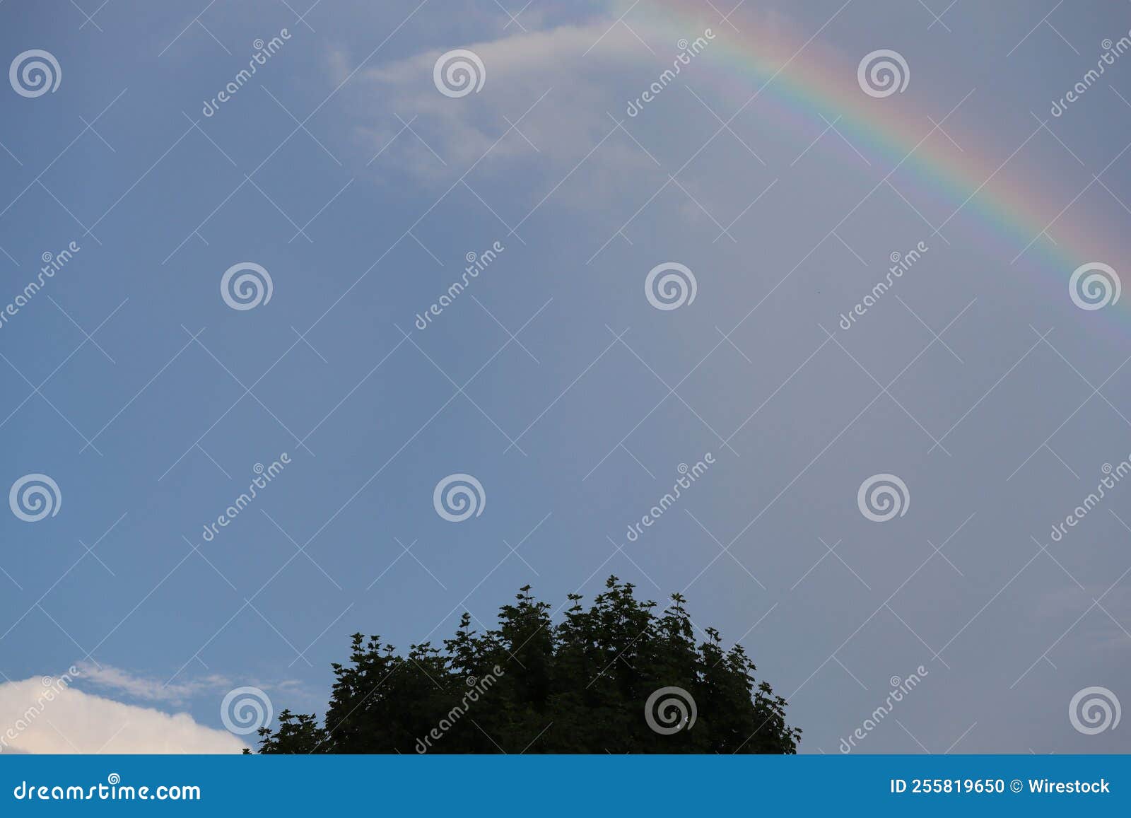 Cloudless Sky with a Small Ray of Rainbow on it Stock Photo - Image of ...