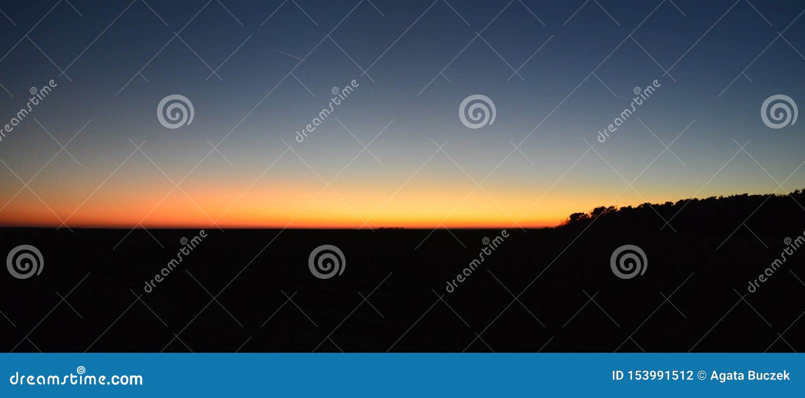 Cloudless Sunset on the Flat Field Stock Photo - Image of field, clouds ...