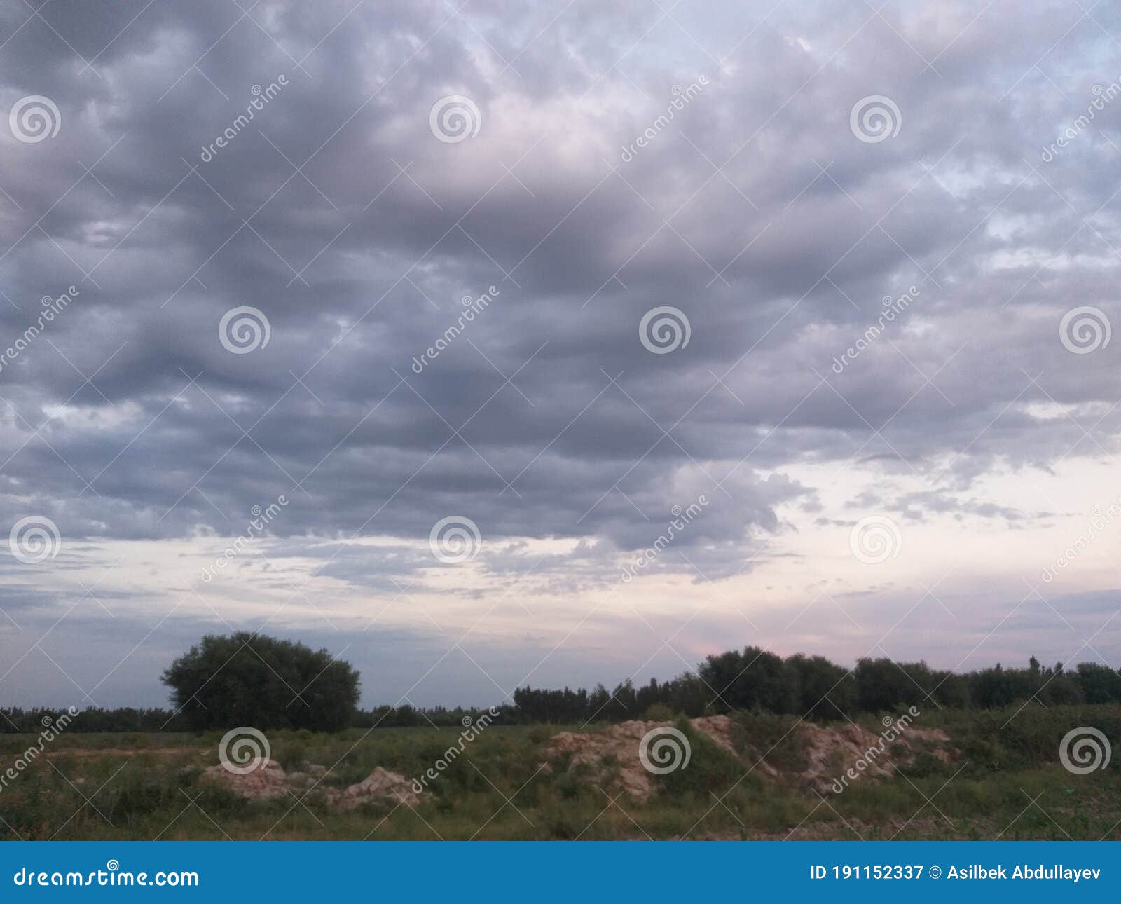 Cloudly Sky in village stock image. Image of tree, countryside - 191152337