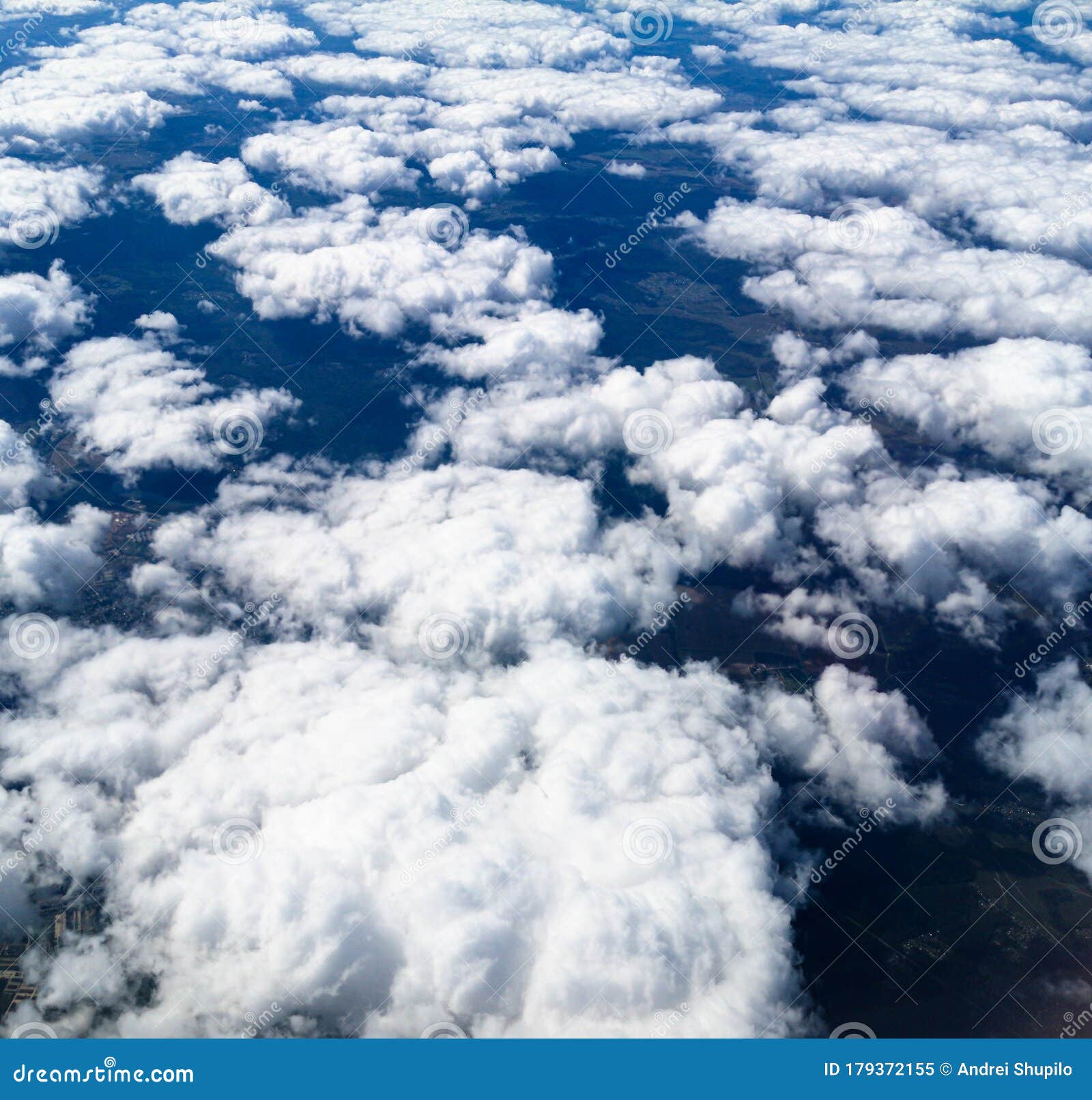 Clouds Above the Ground View from an Airplane As a Background Stock ...