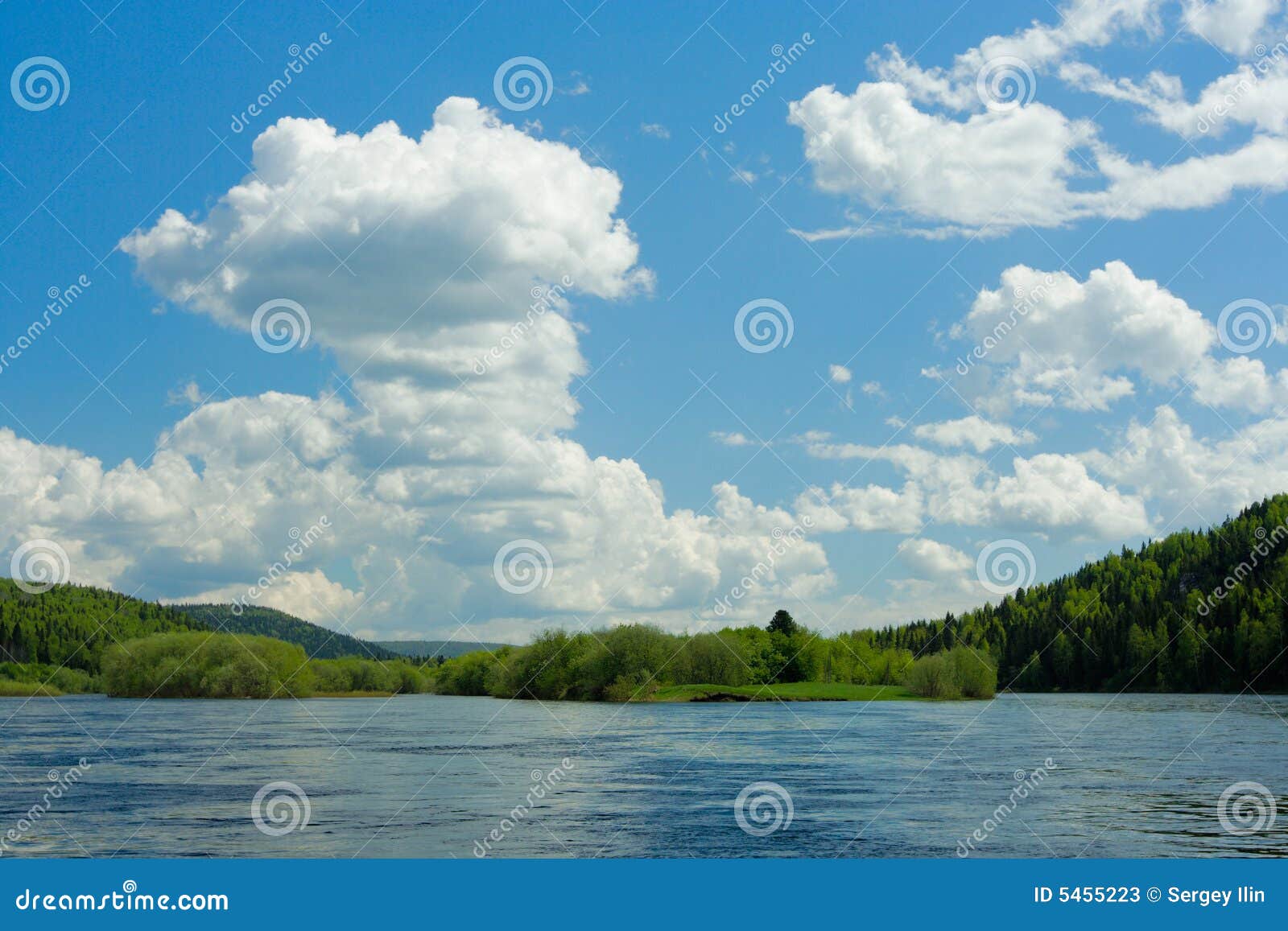 Clouds above the river. stock image. Image of idyllic - 5455223