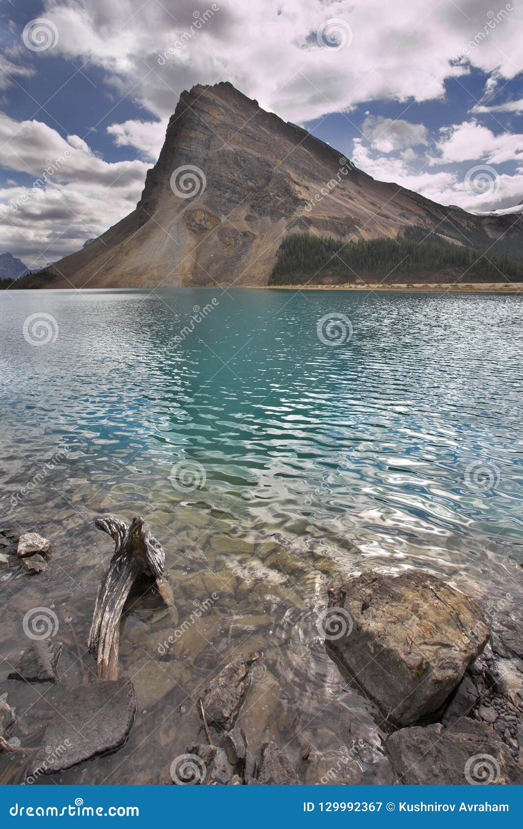Clouds above a rock stock image. Image of canada, meadow - 129992367