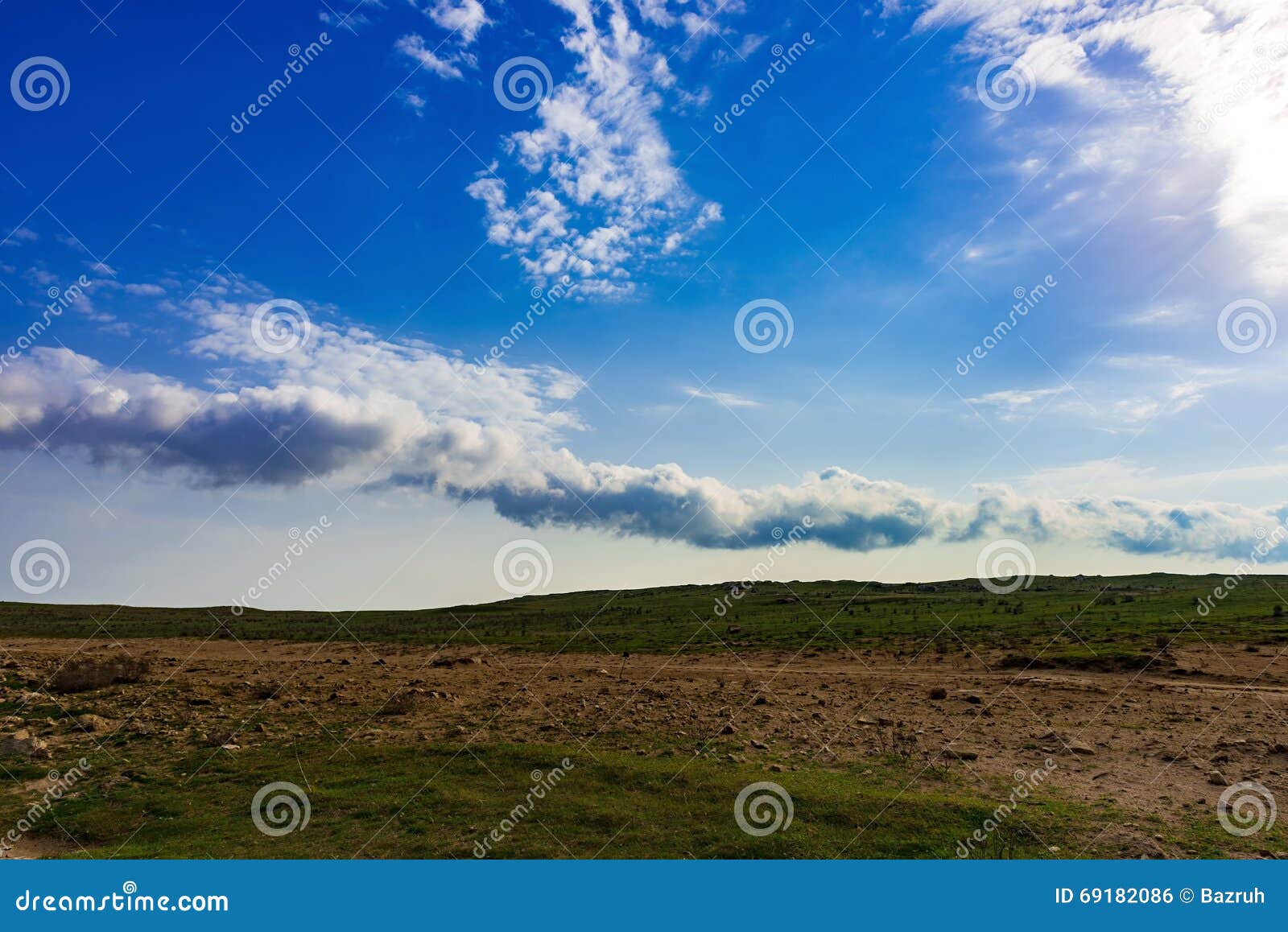 Clouds over field stock photo. Image of heaven, beauty - 69182086