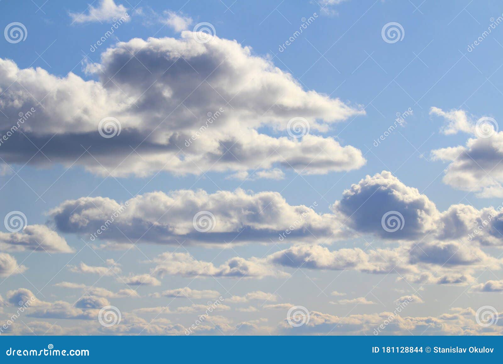 Clouds in the Blue Sky at Sunset or Dawn Backlit by the Sun. Place for ...