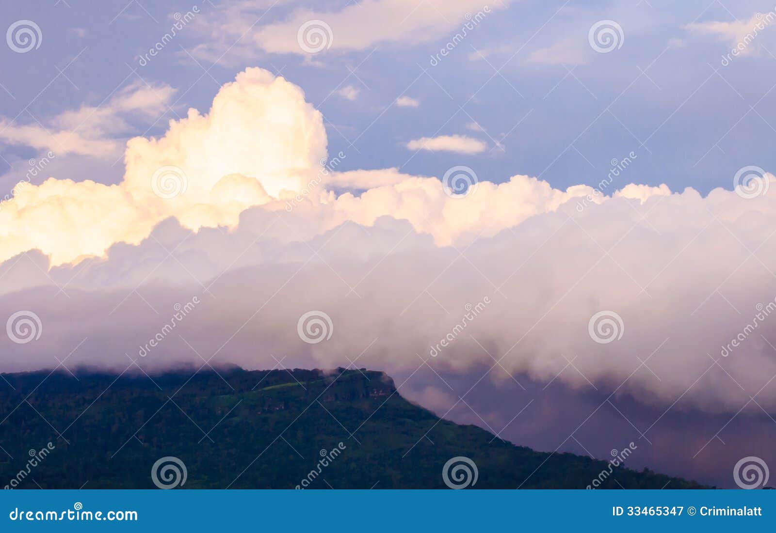 Clouds cover the mountain stock image. Image of green - 33465347