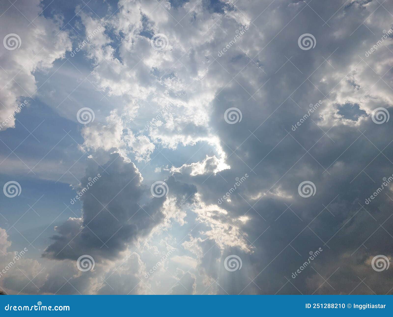 The Clouds Cover the Sun, the Sun Shines through the Clouds Stock Photo ...