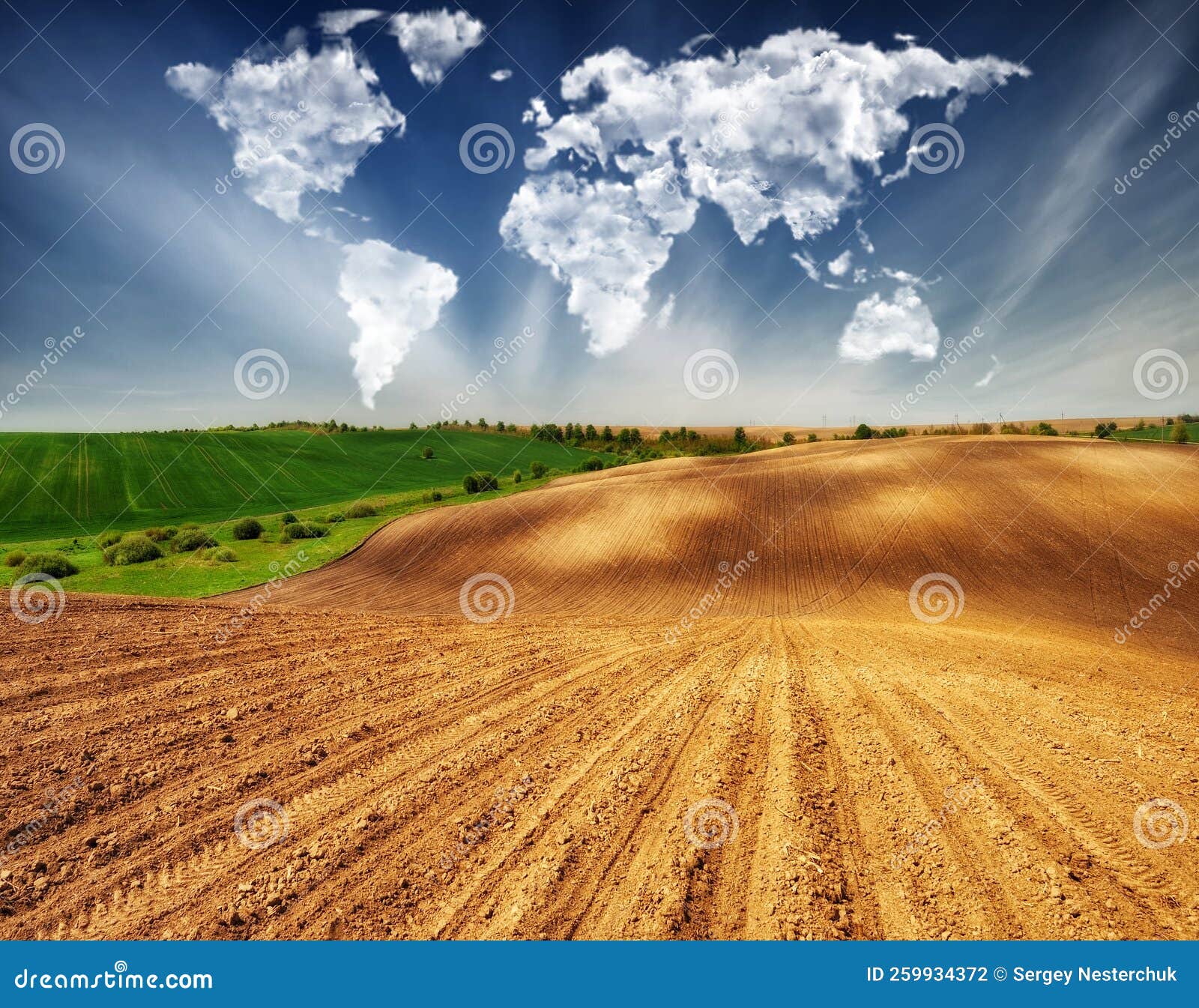 Clouds in the Form of a Map of the World Over the Field. Travel and ...