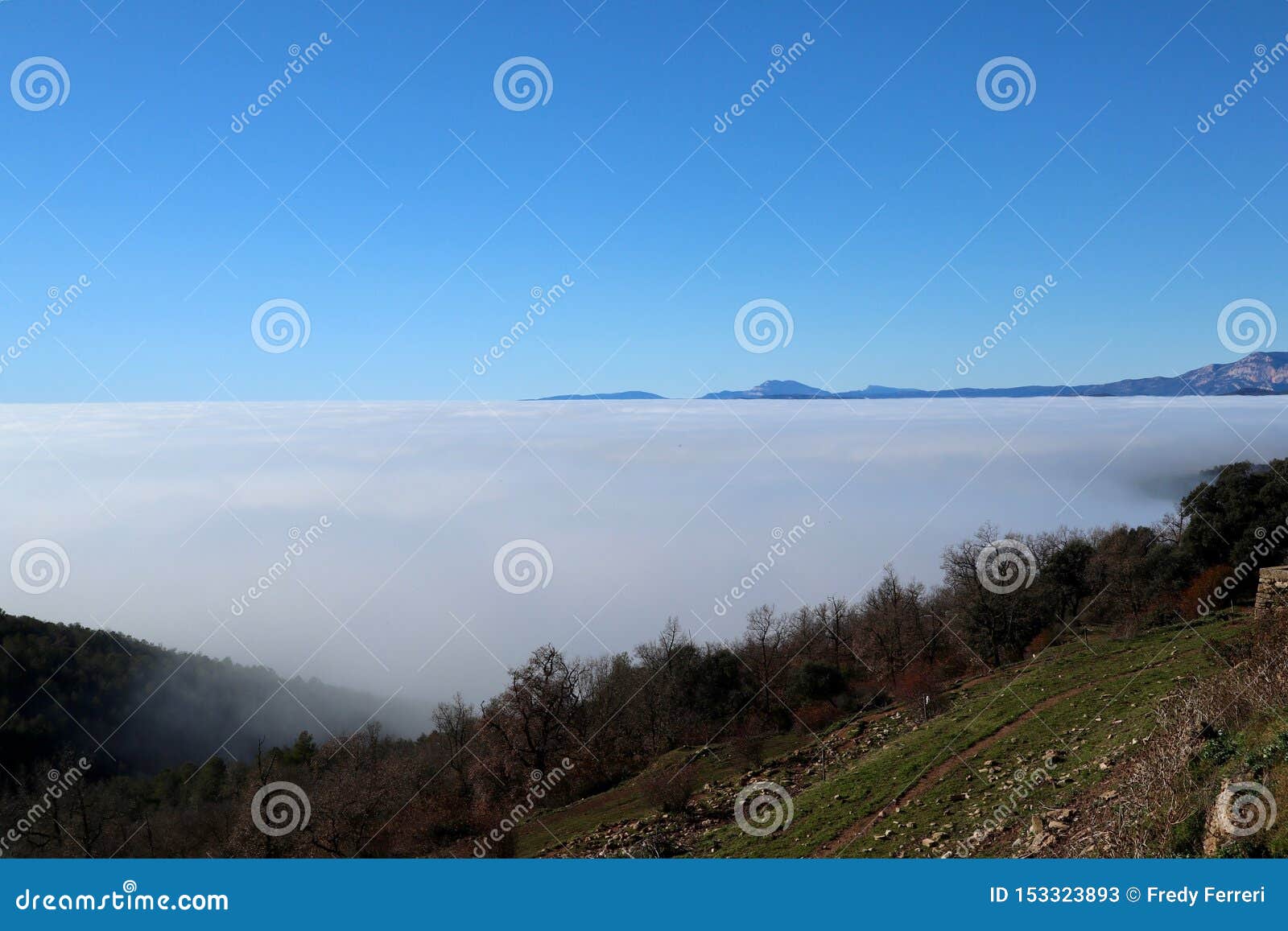 Clouds Touching the Ground in the Middle of the Mountain Stock Image ...