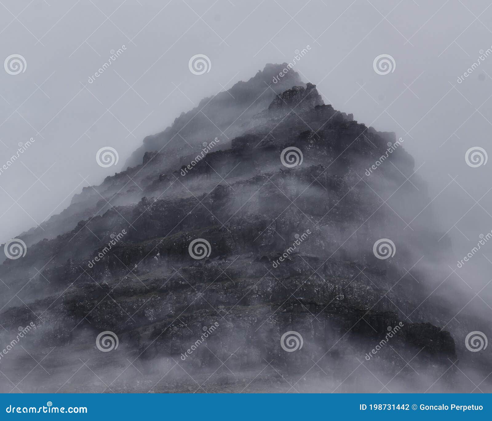 Clouds Moving Very Fast Around Mountain Peak Stock Photo - Image of ...